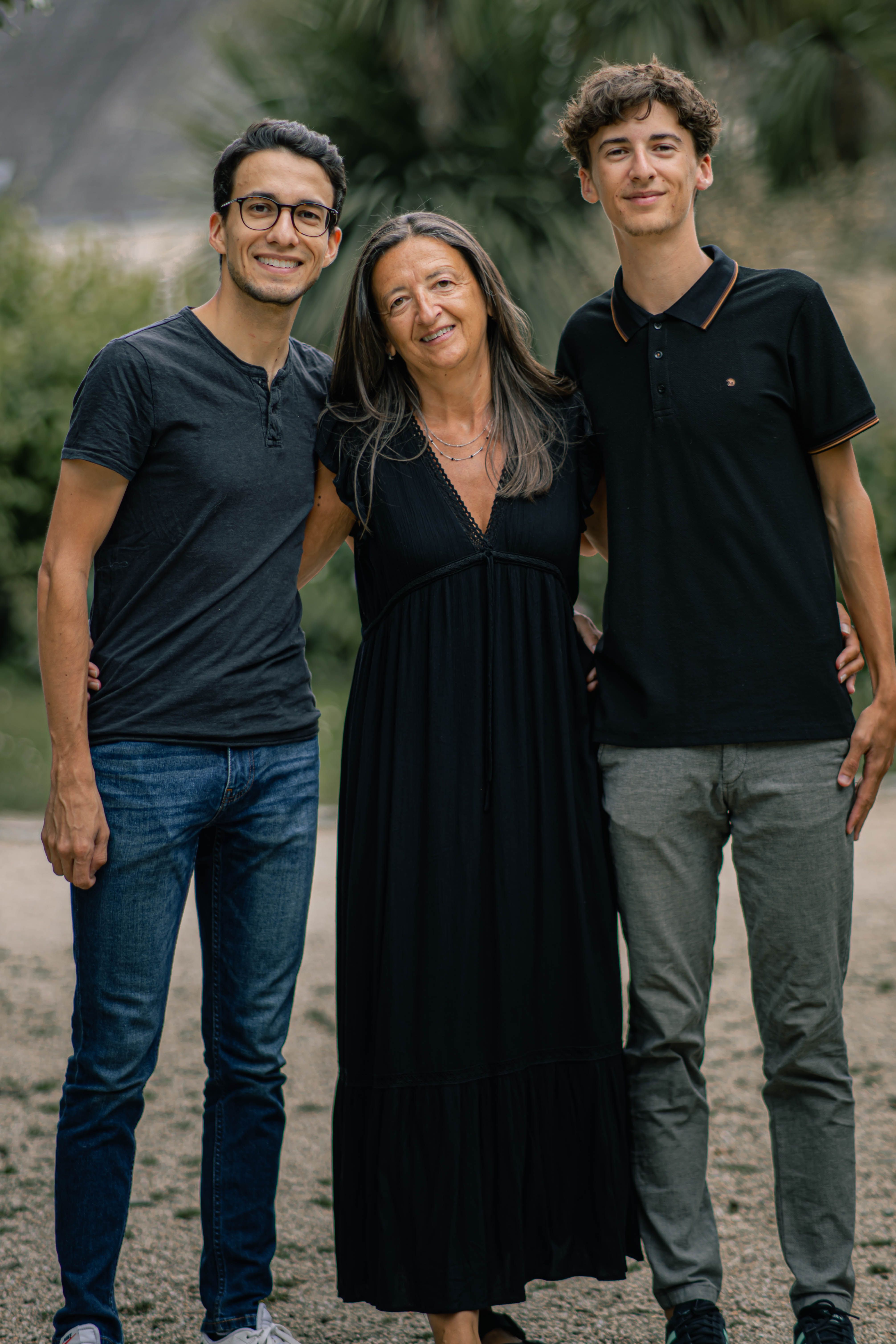 Happy Family Portrait in Outdoor Setting · Free Stock Photo