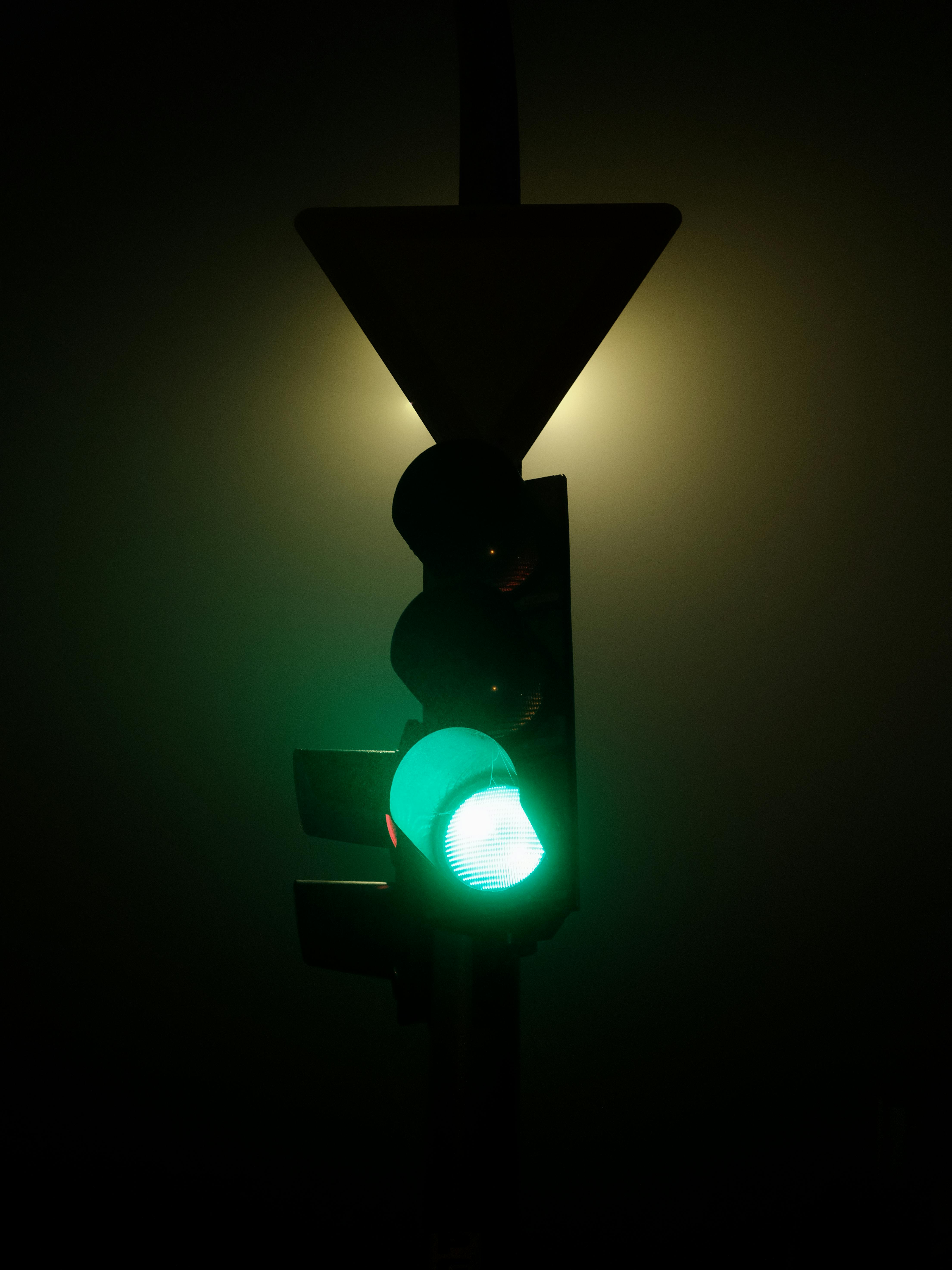 Green Traffic Light Shining Through Fog at Night · Free Stock Photo