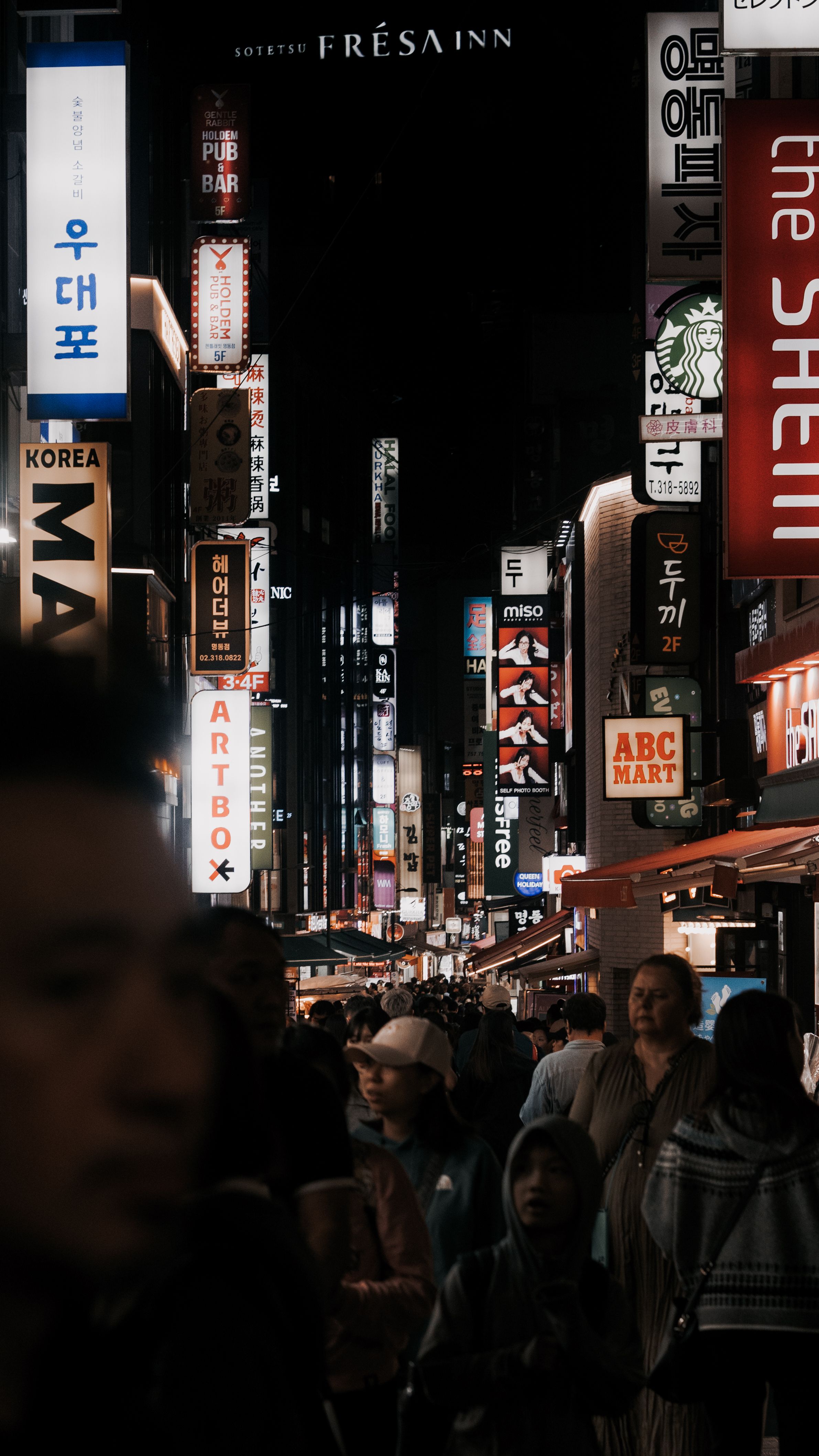Vibrant Nightlife Street in Busy Urban Area · Free Stock Photo