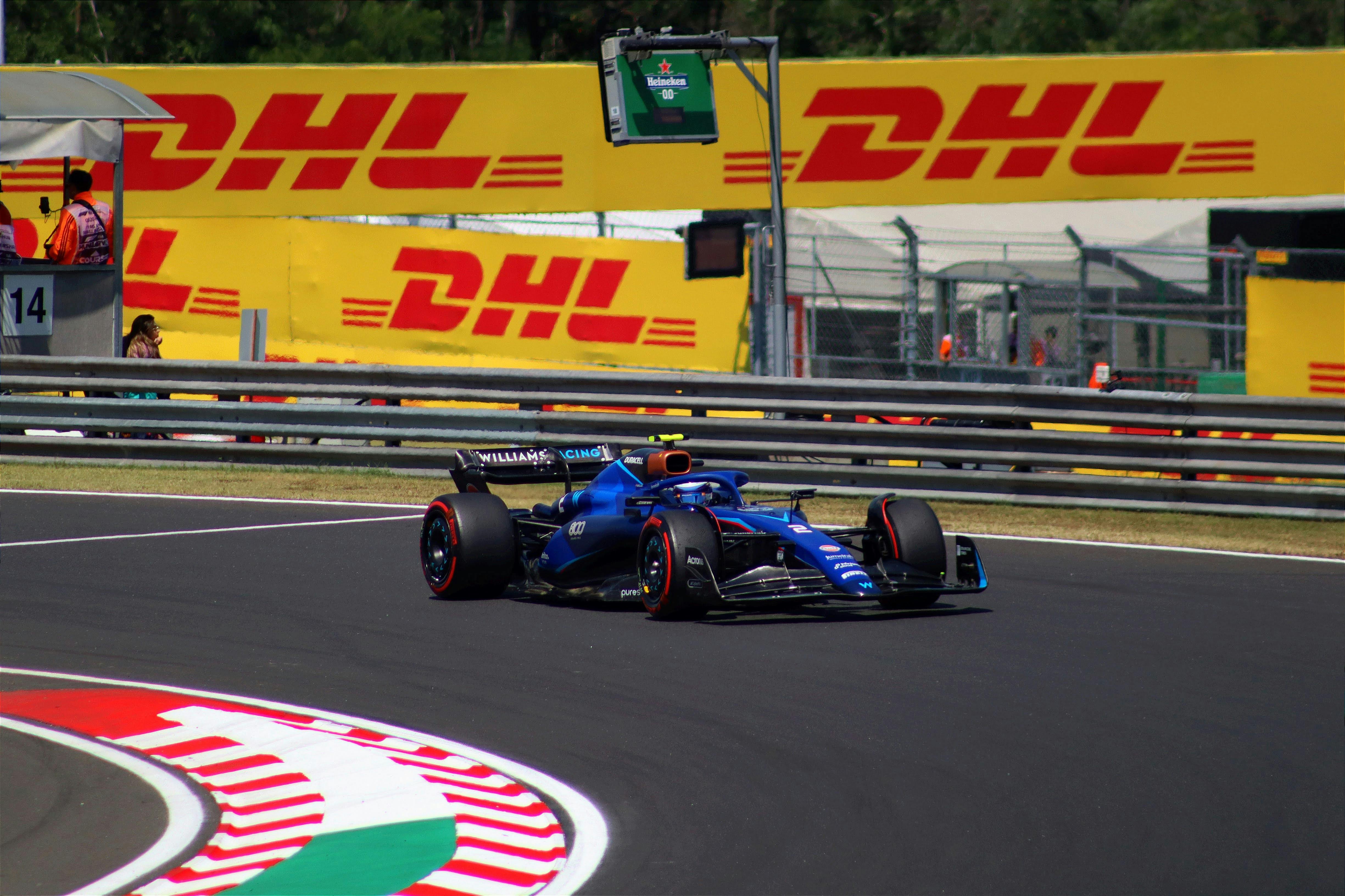 High-Speed Formula One Race Car on Track · Free Stock Photo