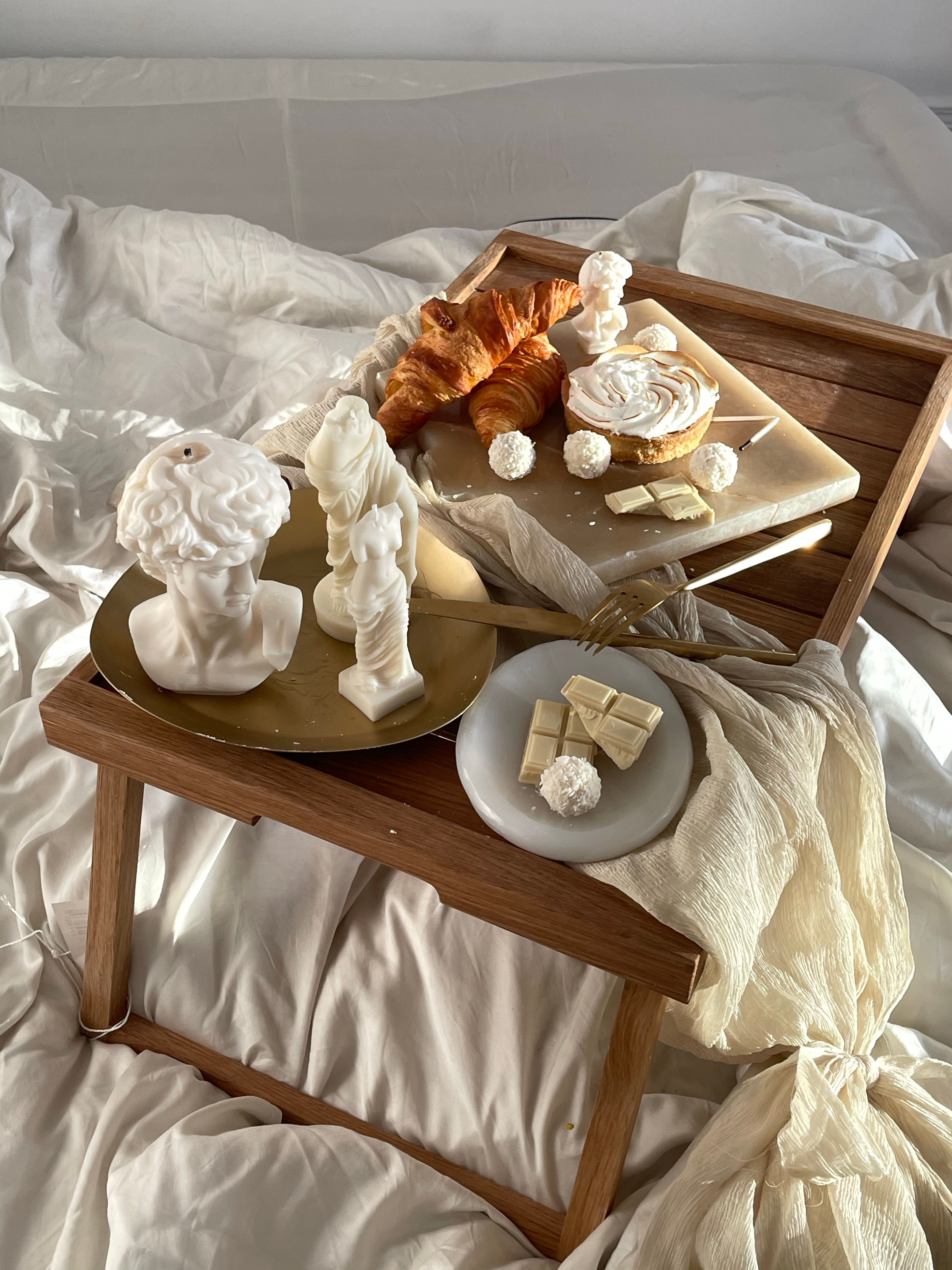 Elegant Breakfast Tray with Pastries and Sculptures · Free Stock Photo
