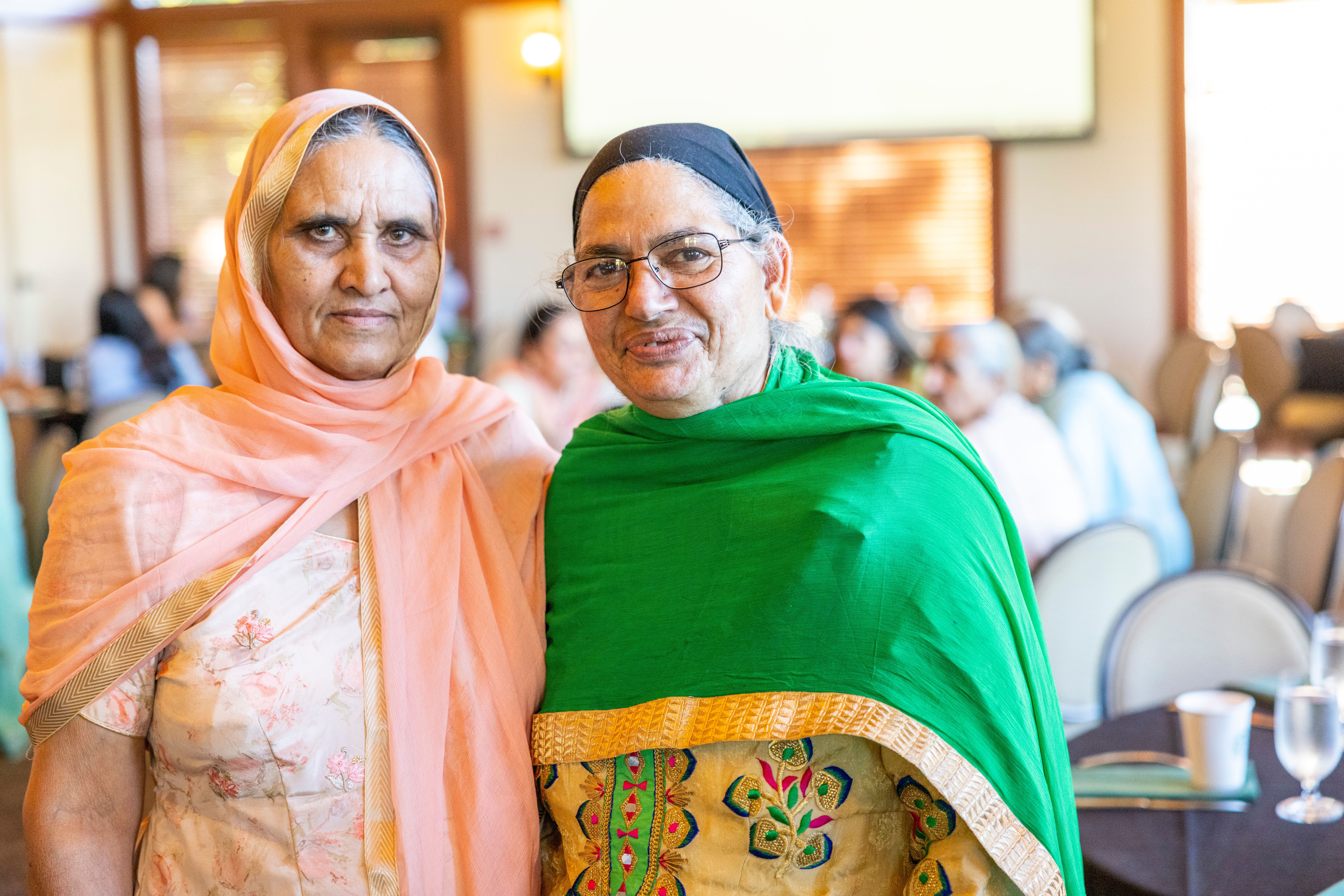 Elderly Women in Traditional Clothing at a Gathering · Free Stock Photo