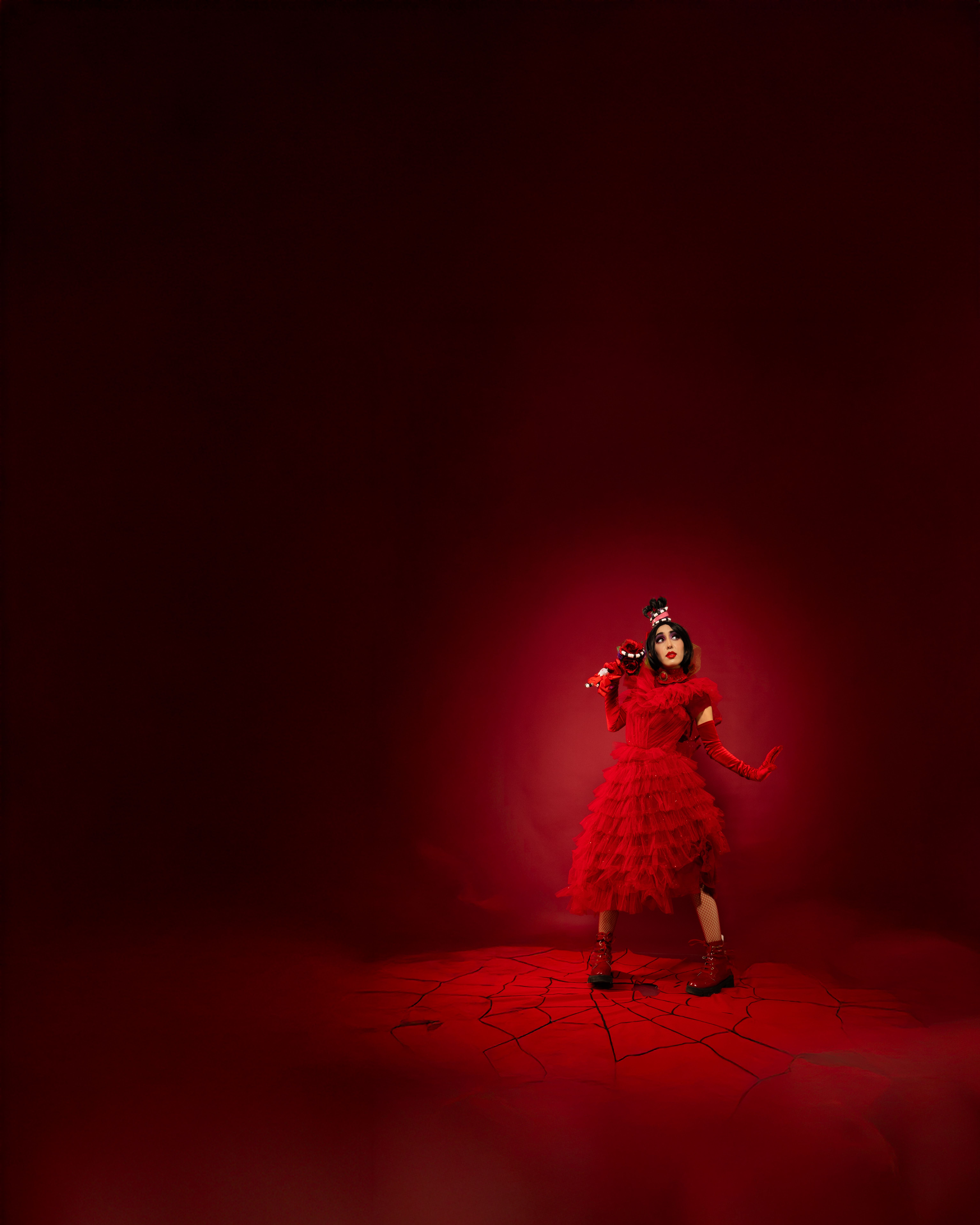 Creative Cosplay in Dramatic Red Lighting · Free Stock Photo