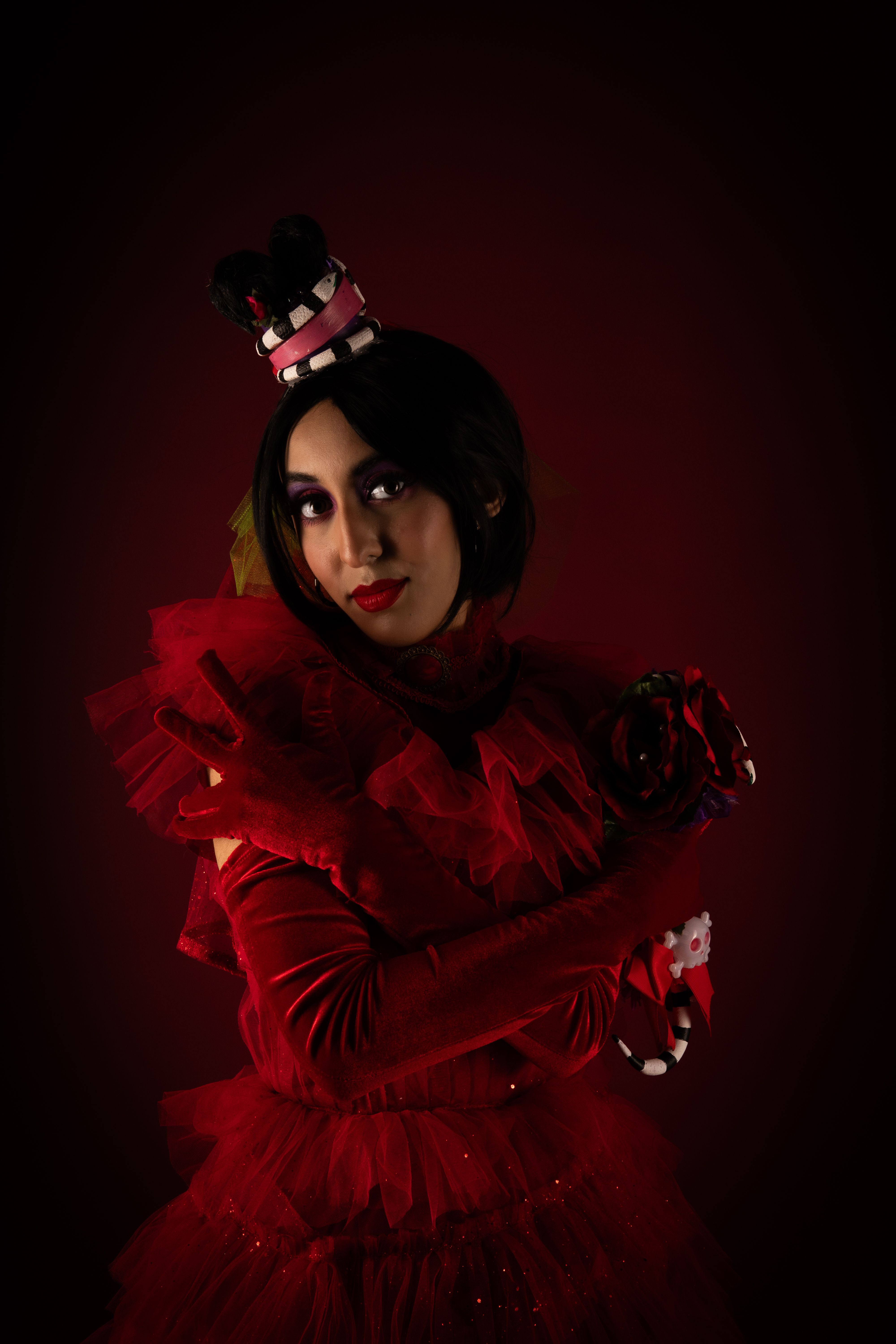 Enchanting Gothic Cosplay Portrait on Dark Red · Free Stock Photo