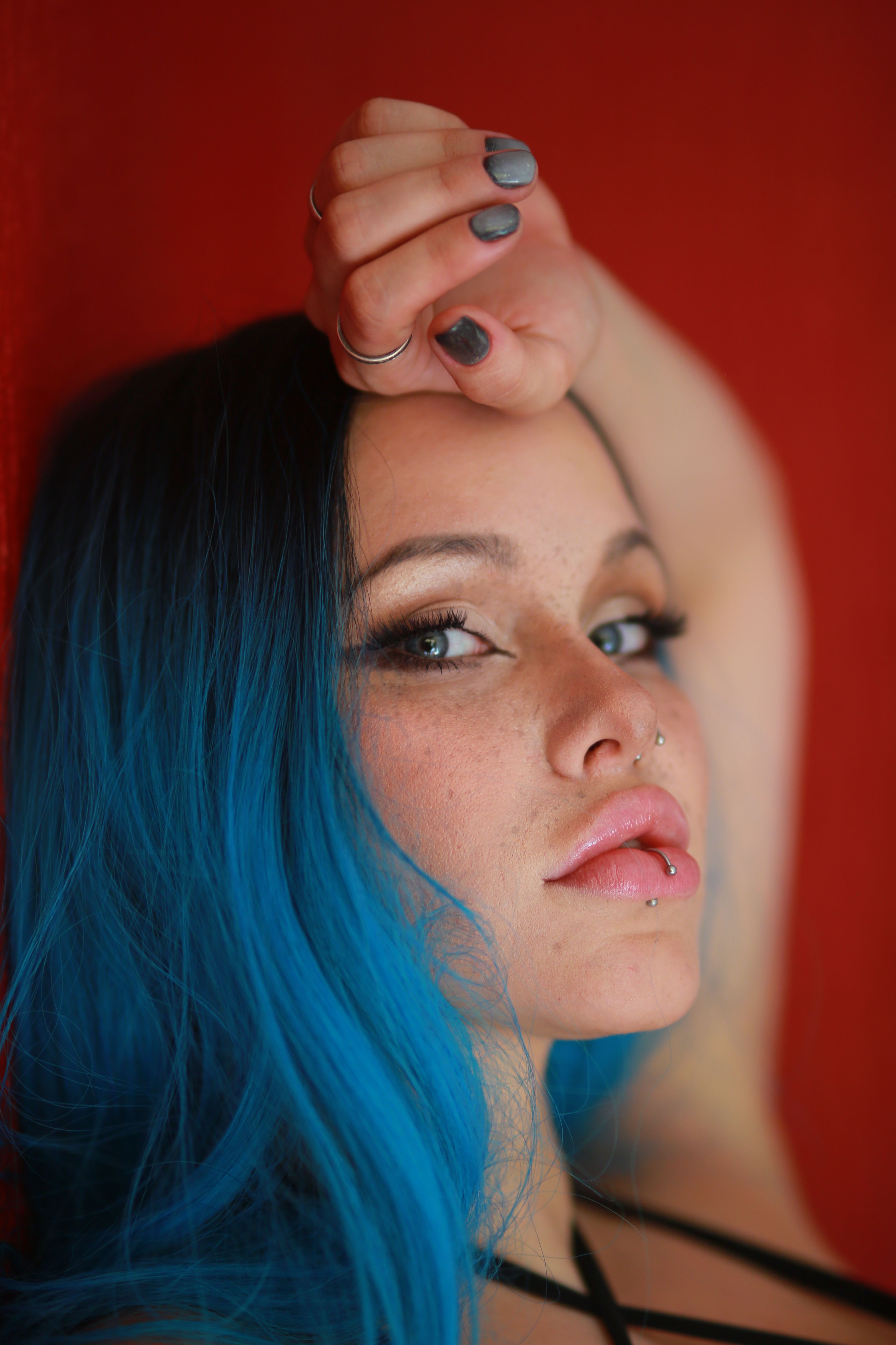 Vibrant Portrait of a Young Woman with Blue Hair · Free Stock Photo
