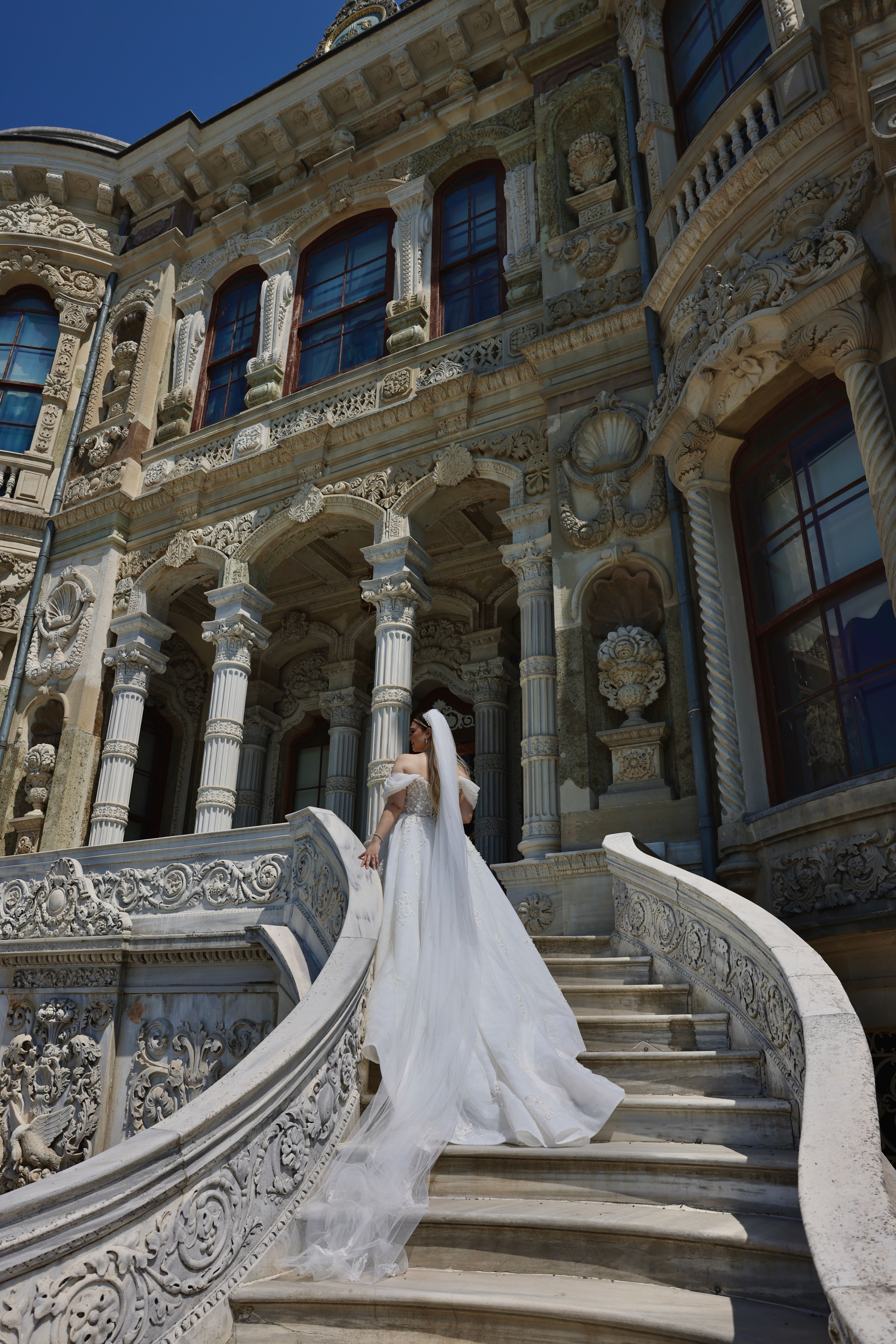Bride Ascending Dolmabahçe Palace Steps in İstanbul · Free Stock Photo