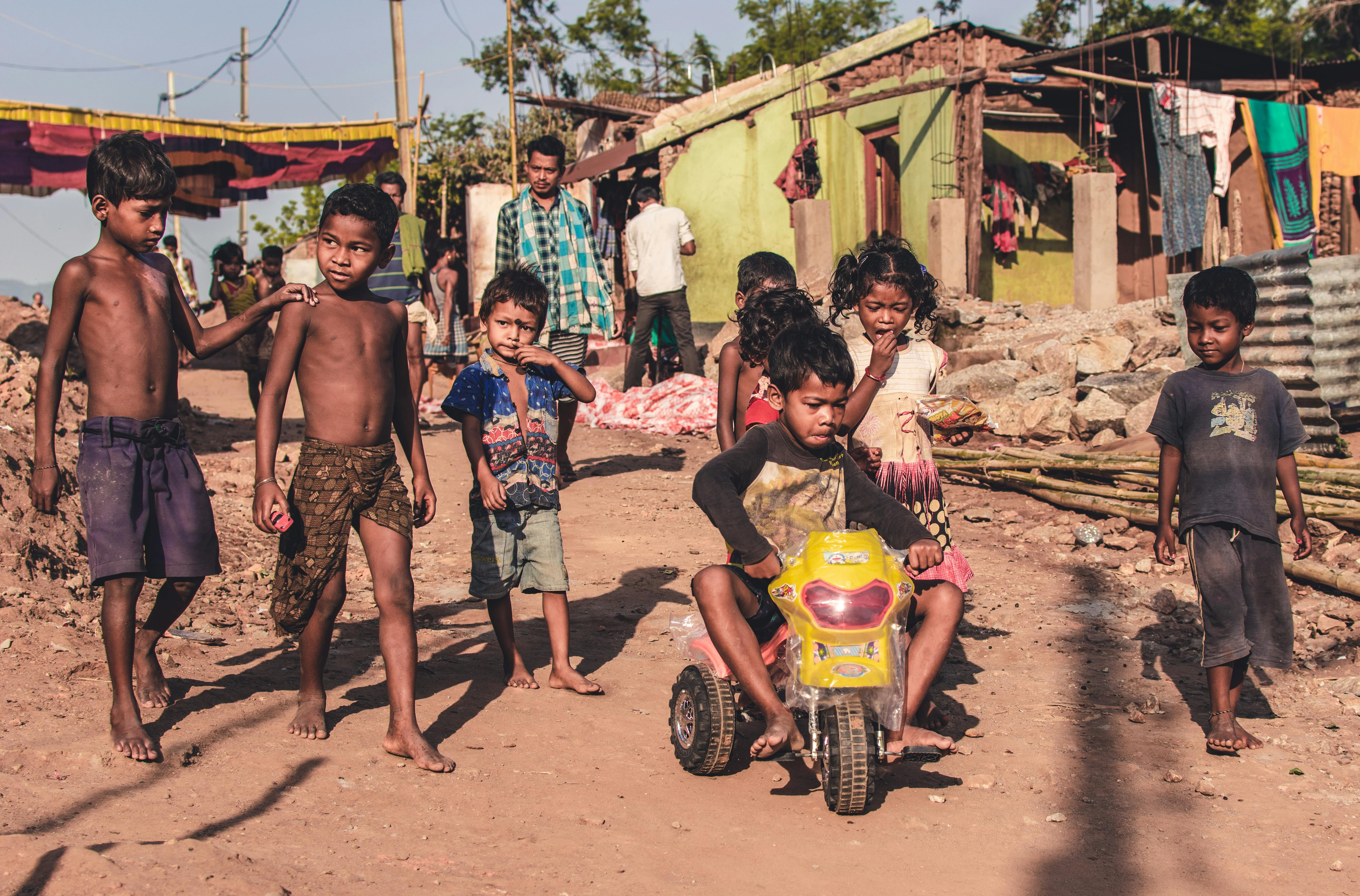 A Group of Kids Walking Together in a Rural Area · Free Stock Photo