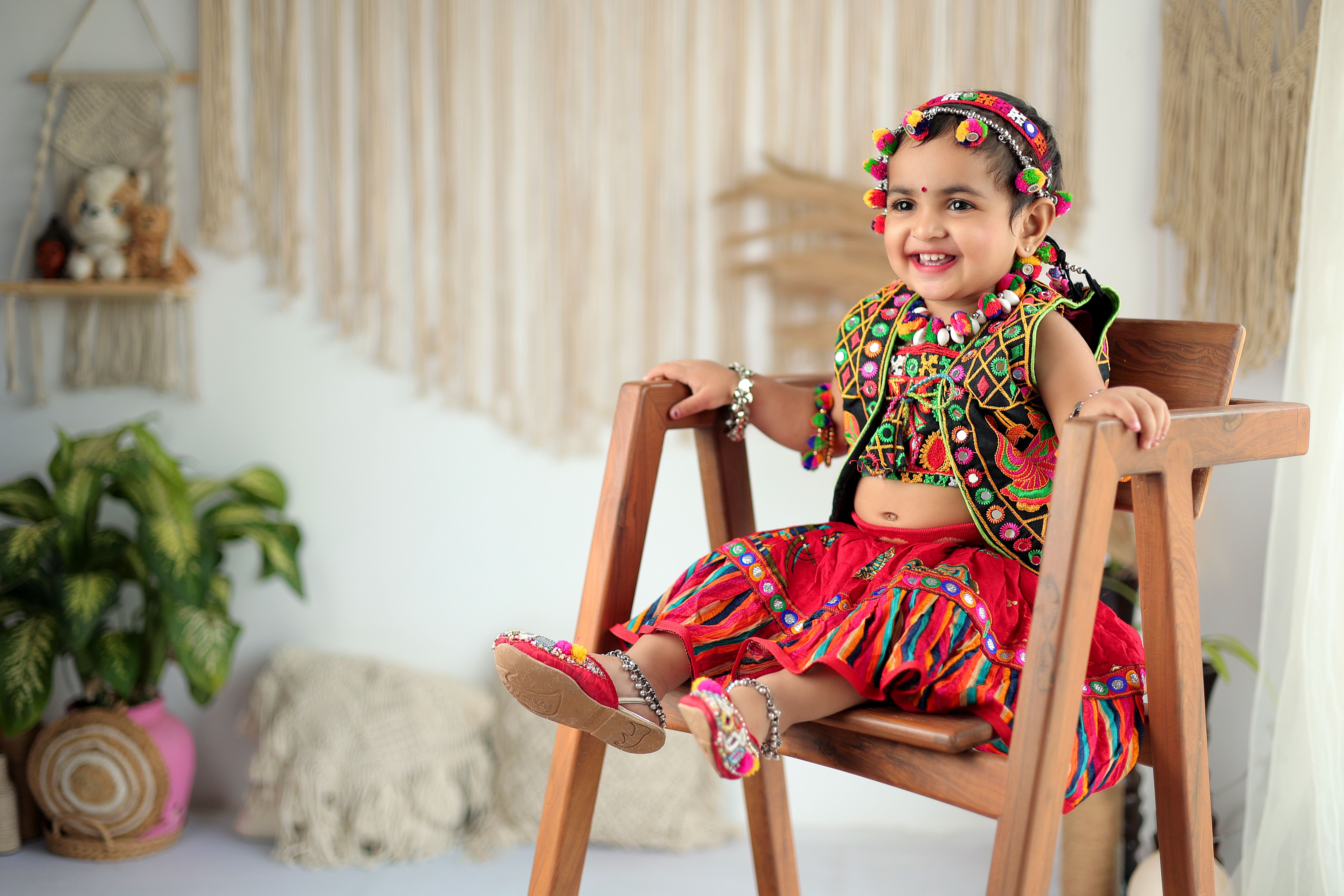 Adorable Child in Traditional Indian Attire Indoors · Free Stock Photo