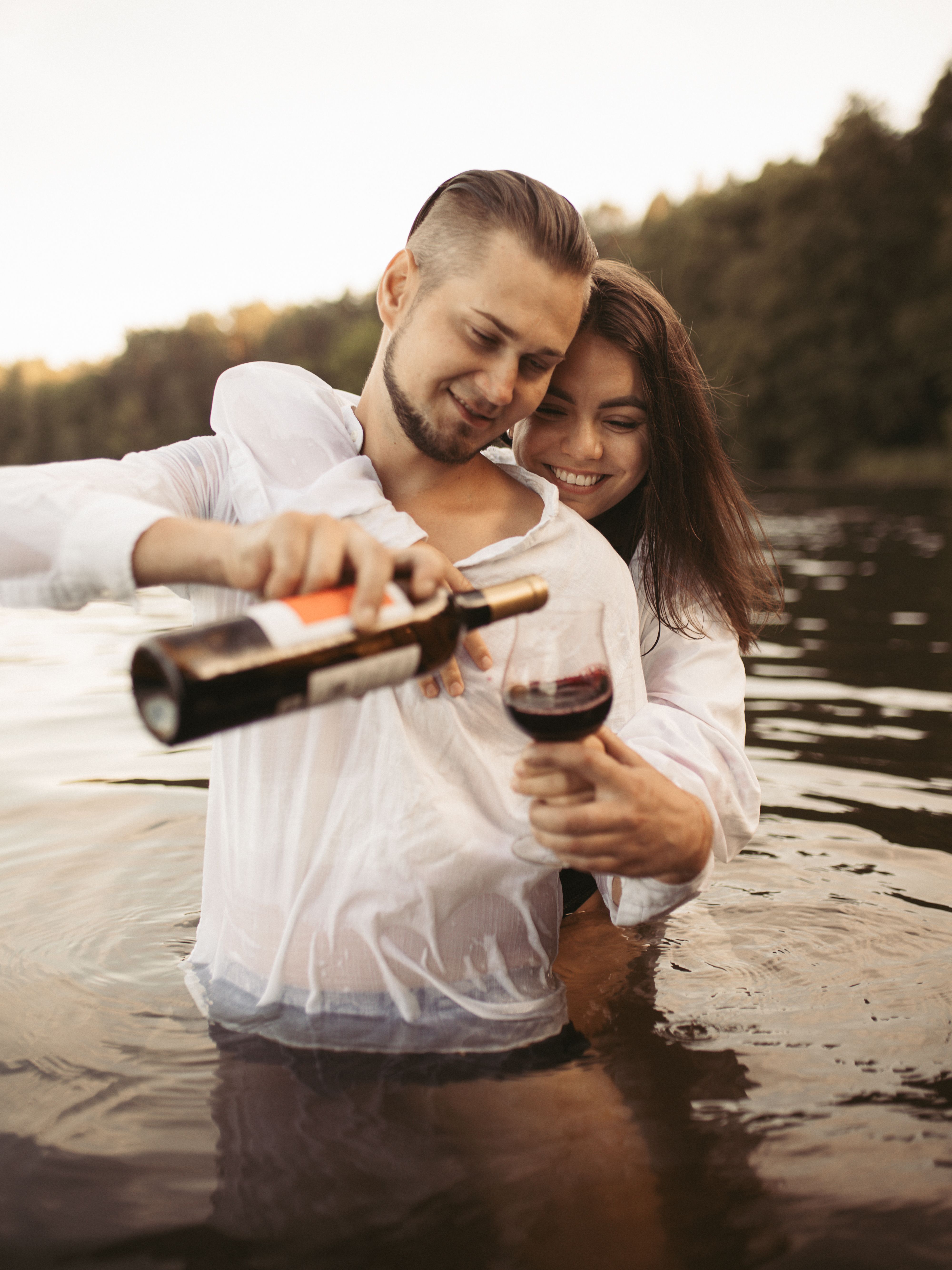 Romantic Couple Enjoying Wine in Nature · Free Stock Photo