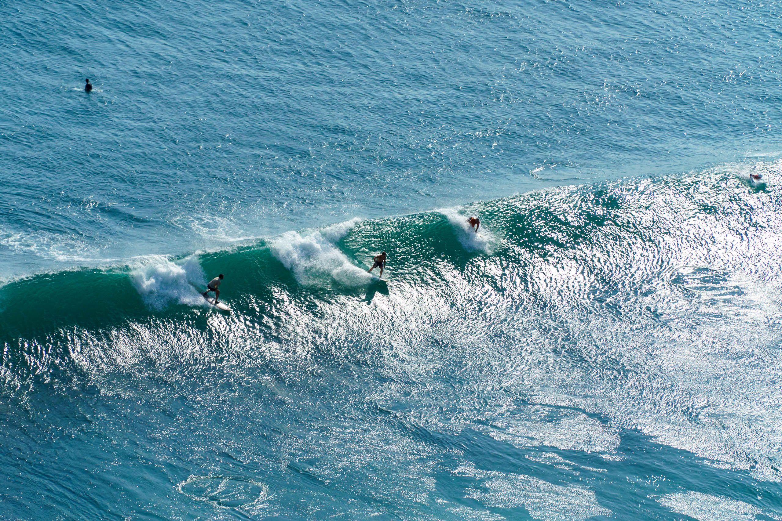 Surfing Adventure on Bali's Rolling Waves · Free Stock Photo
