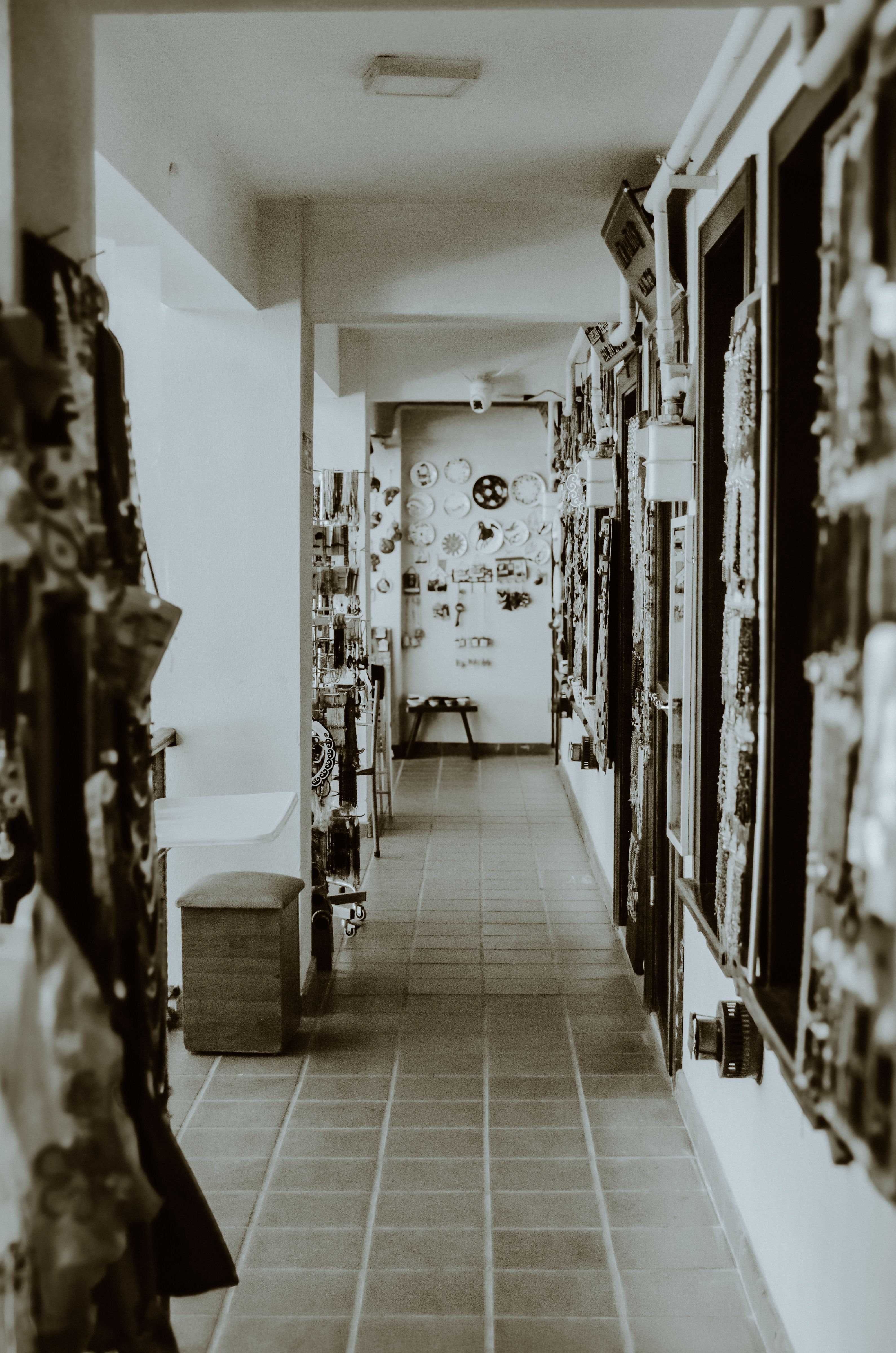 Cozy Indoor Bazaar Hallway with Handicrafts Displayed · Free Stock Photo