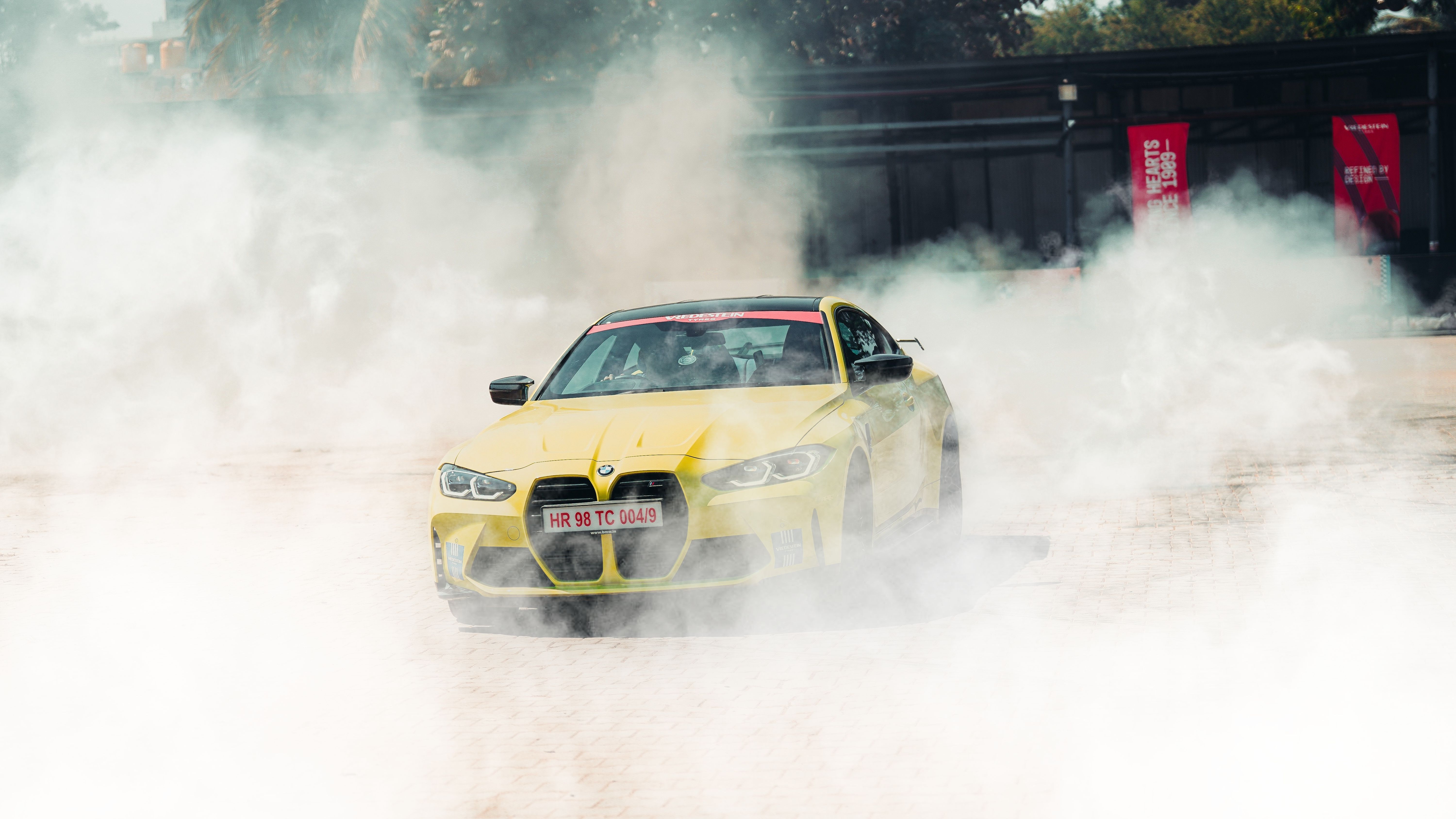 Yellow Sports Car Drifting in Dense Smoke · Free Stock Photo