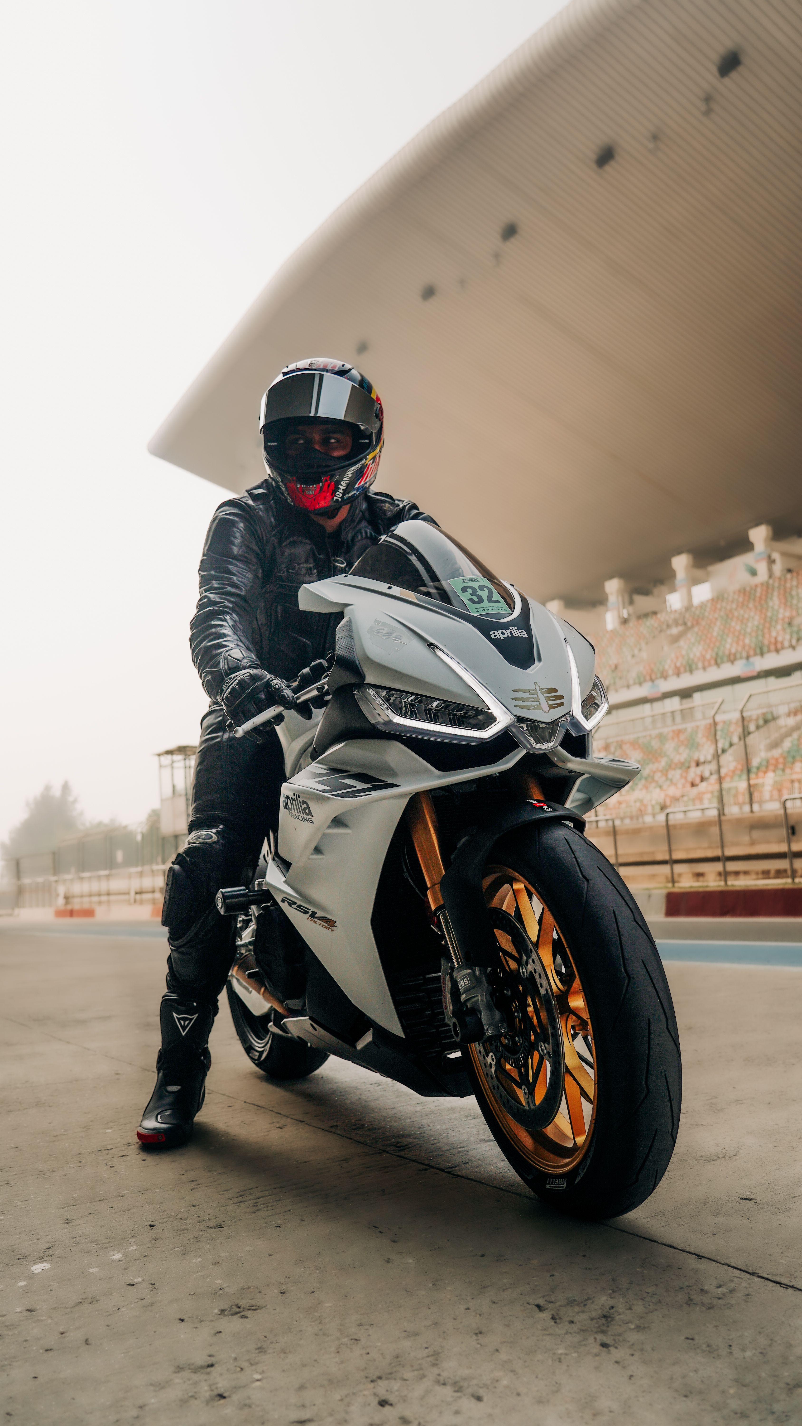Motorcyclist Posing on Racing Track with Sportbike · Free Stock Photo