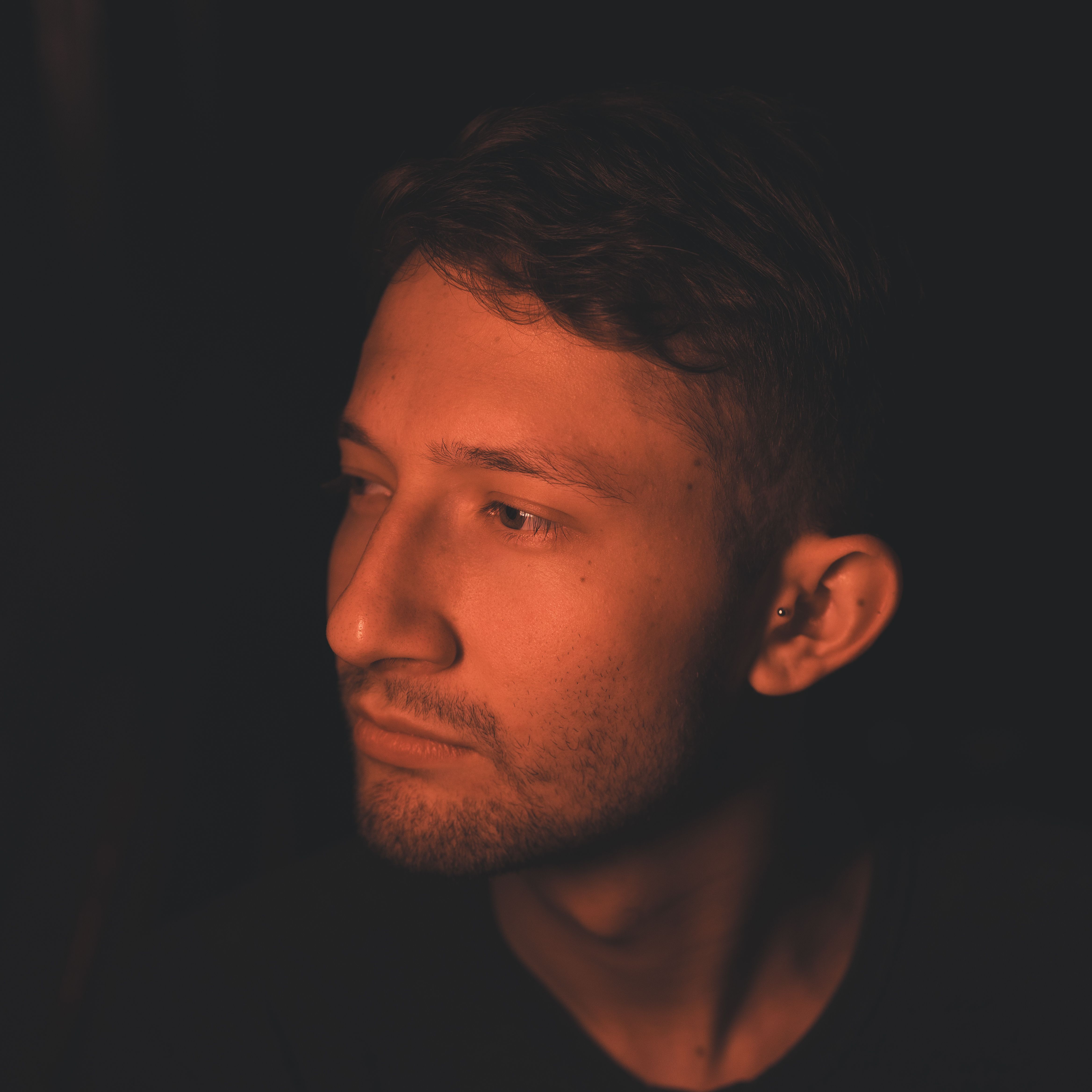Moody Portrait of a Man in Warm Lighting · Free Stock Photo