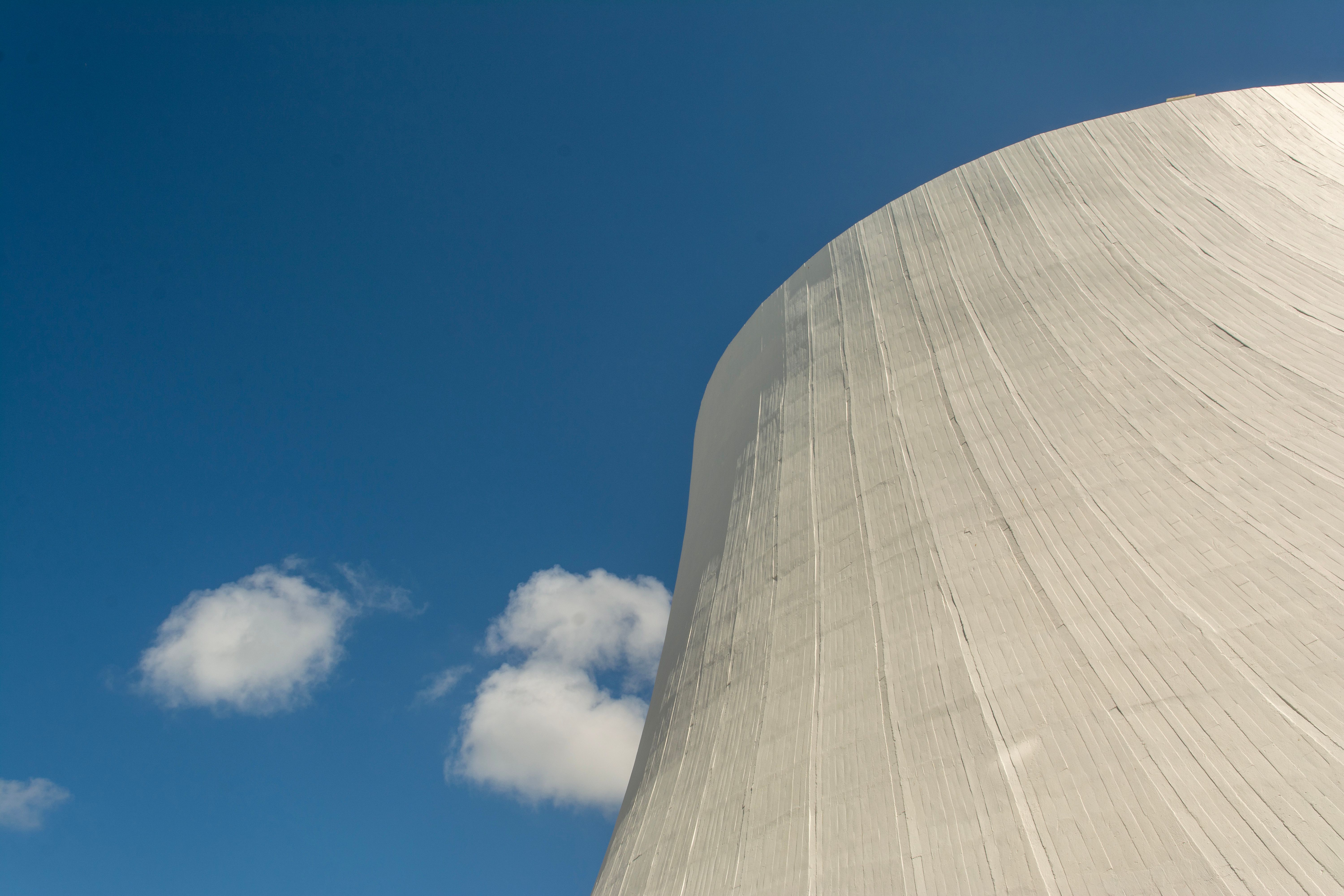 Modern Architectural Structure Against Blue Sky · Free Stock Photo