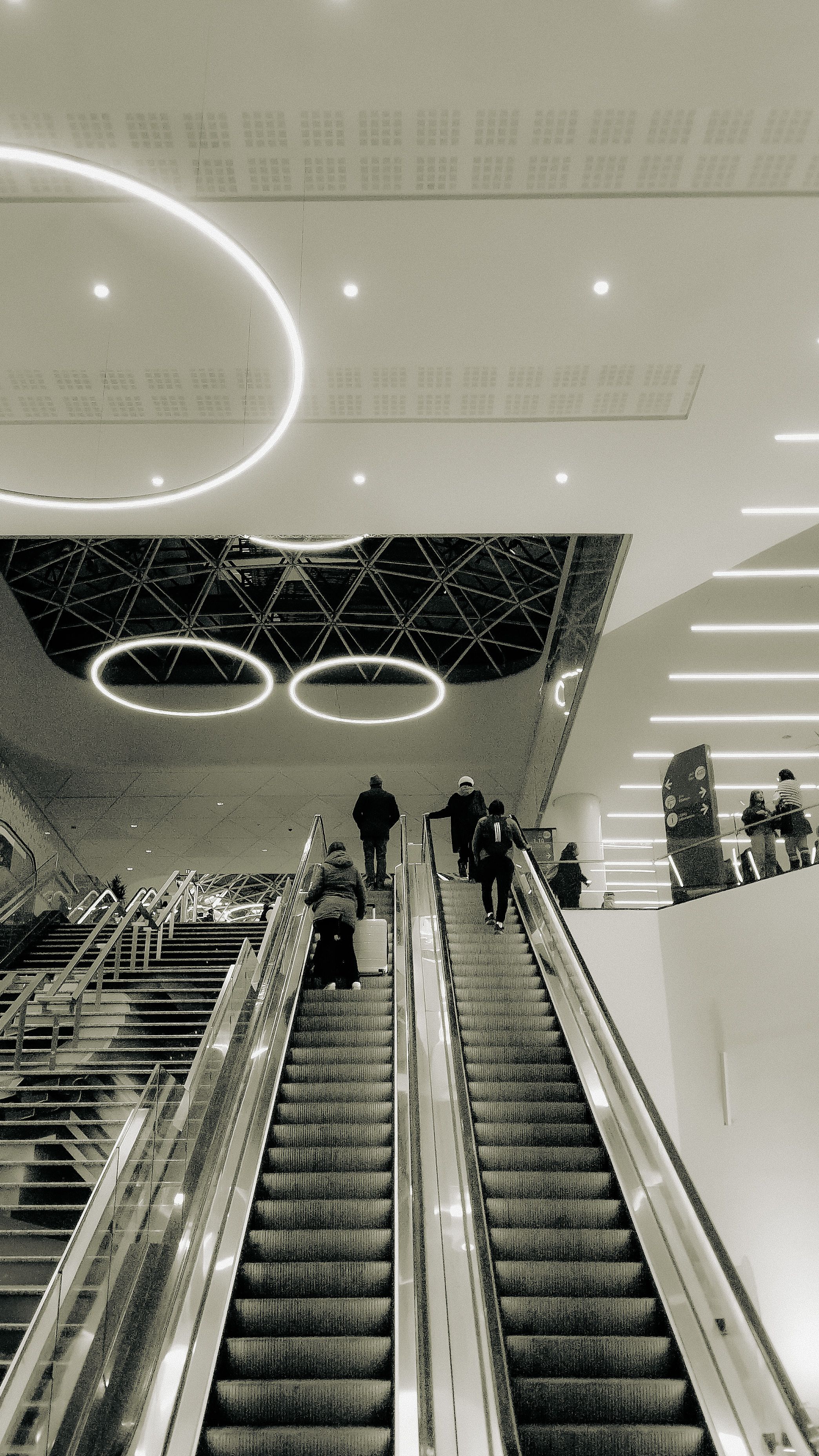 Modern Shopping Mall Interior with Escalators · Free Stock Photo