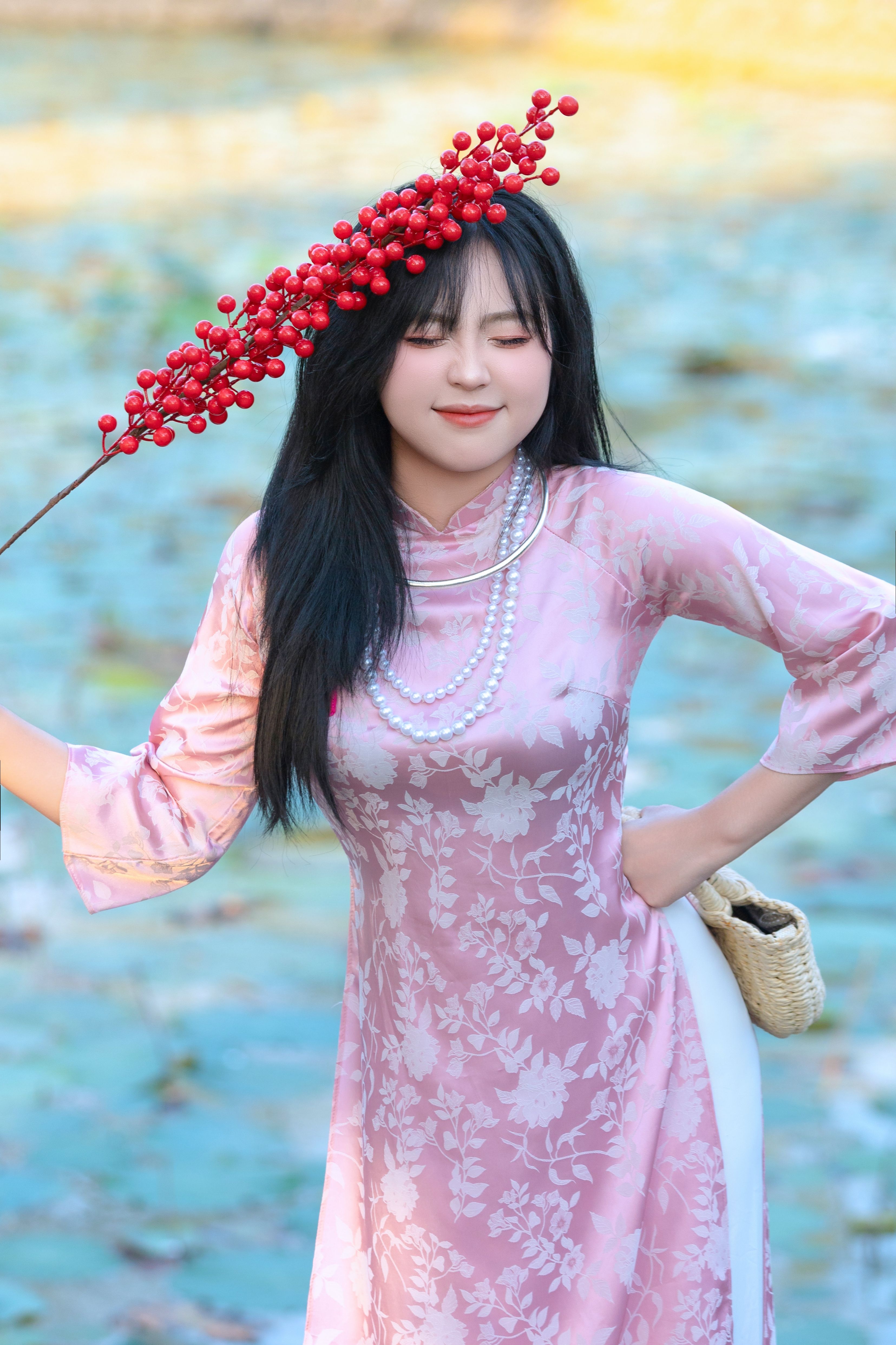 Woman in Traditional Dress Holding Red Berries Outdoors · Free Stock Photo