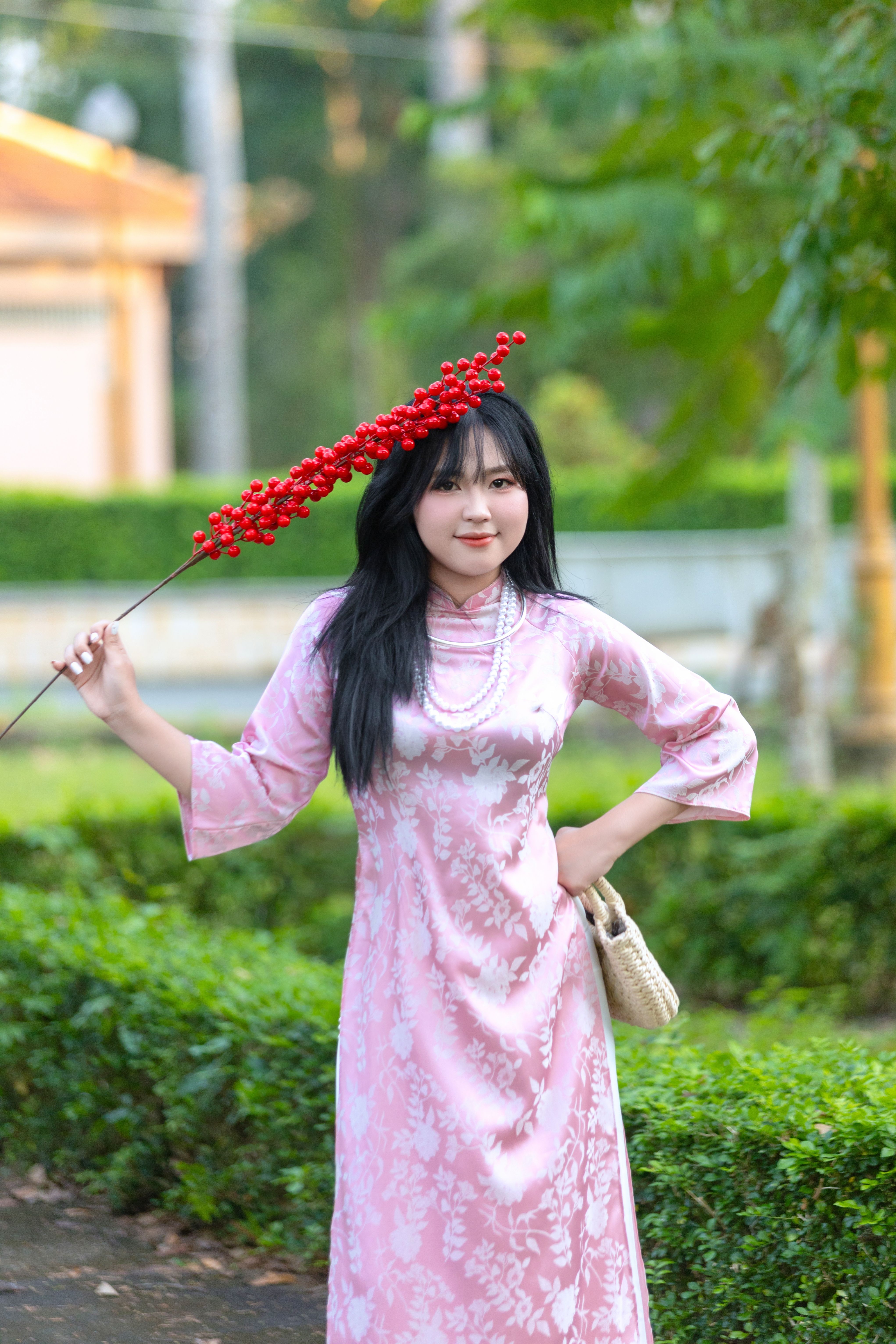 Woman in Traditional Dress Holding Red Berries Outdoors · Free Stock Photo