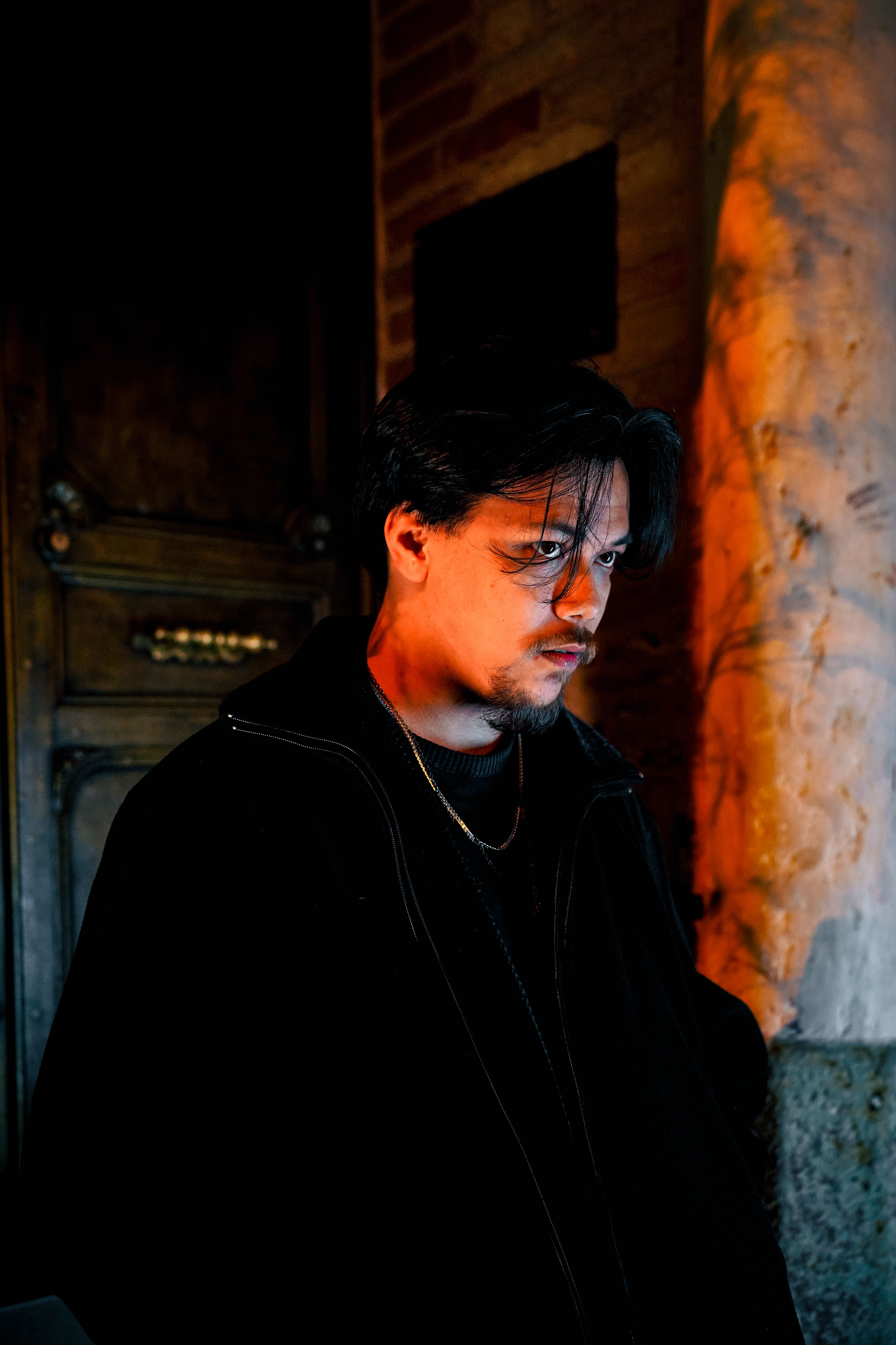Moody Portrait of a Man in Dramatic Lighting · Free Stock Photo