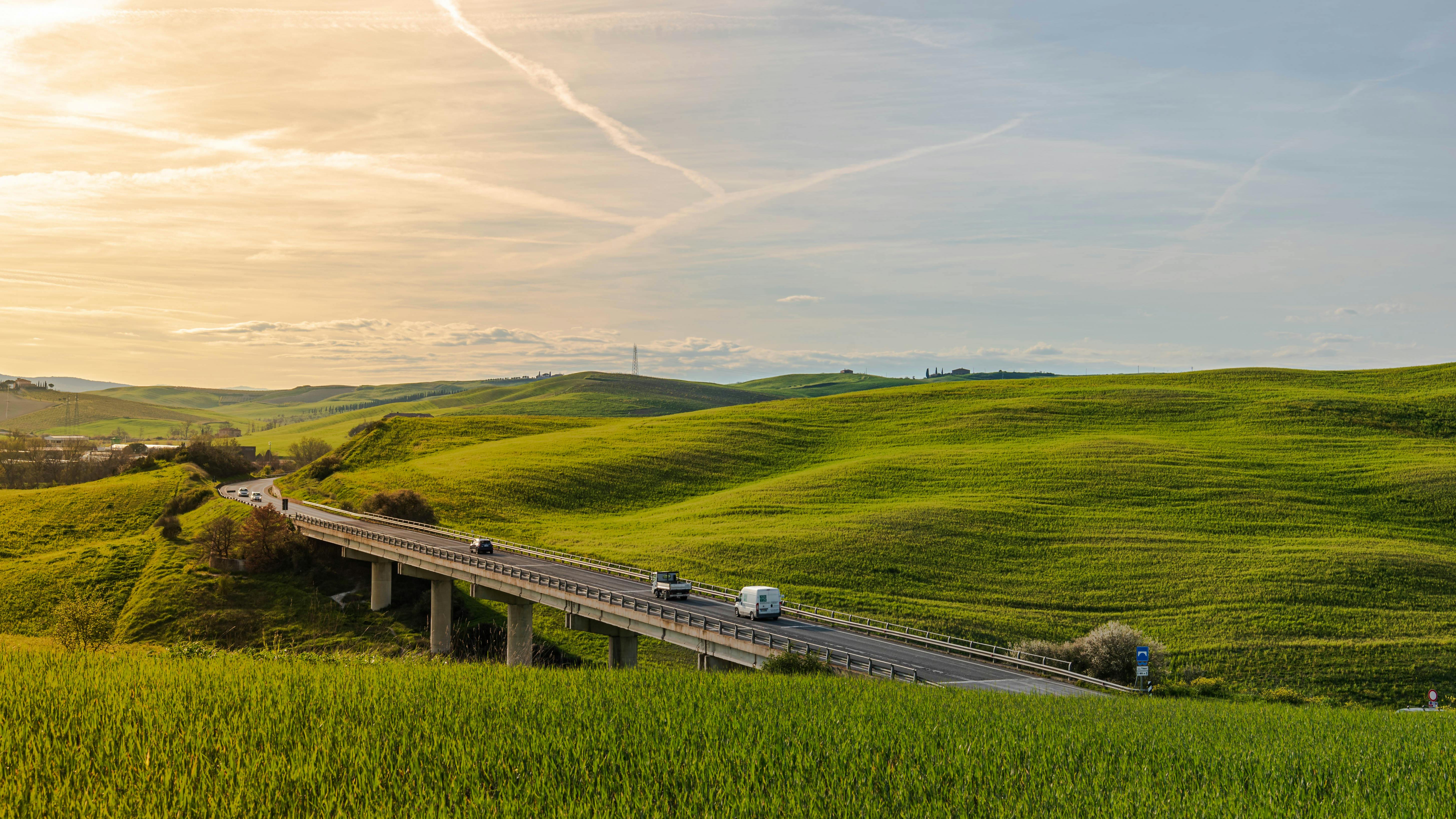 Scenic Countryside Road in Tuscany at Sunset · Free Stock Photo