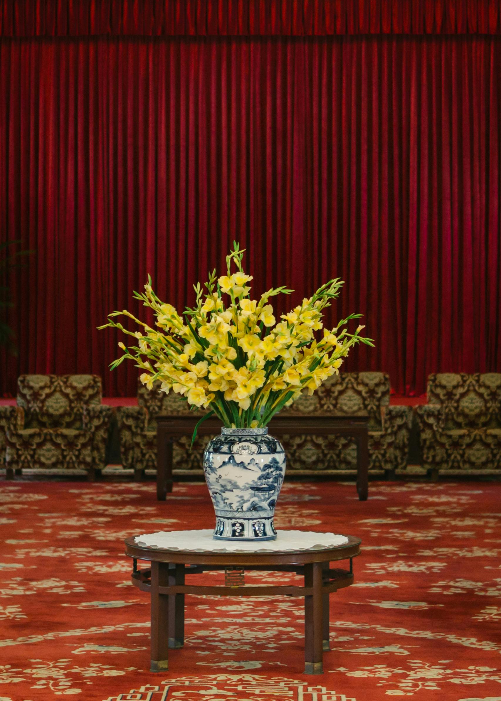 Elegant Floral Arrangement in Vietnamese Museum Room · Free Stock Photo