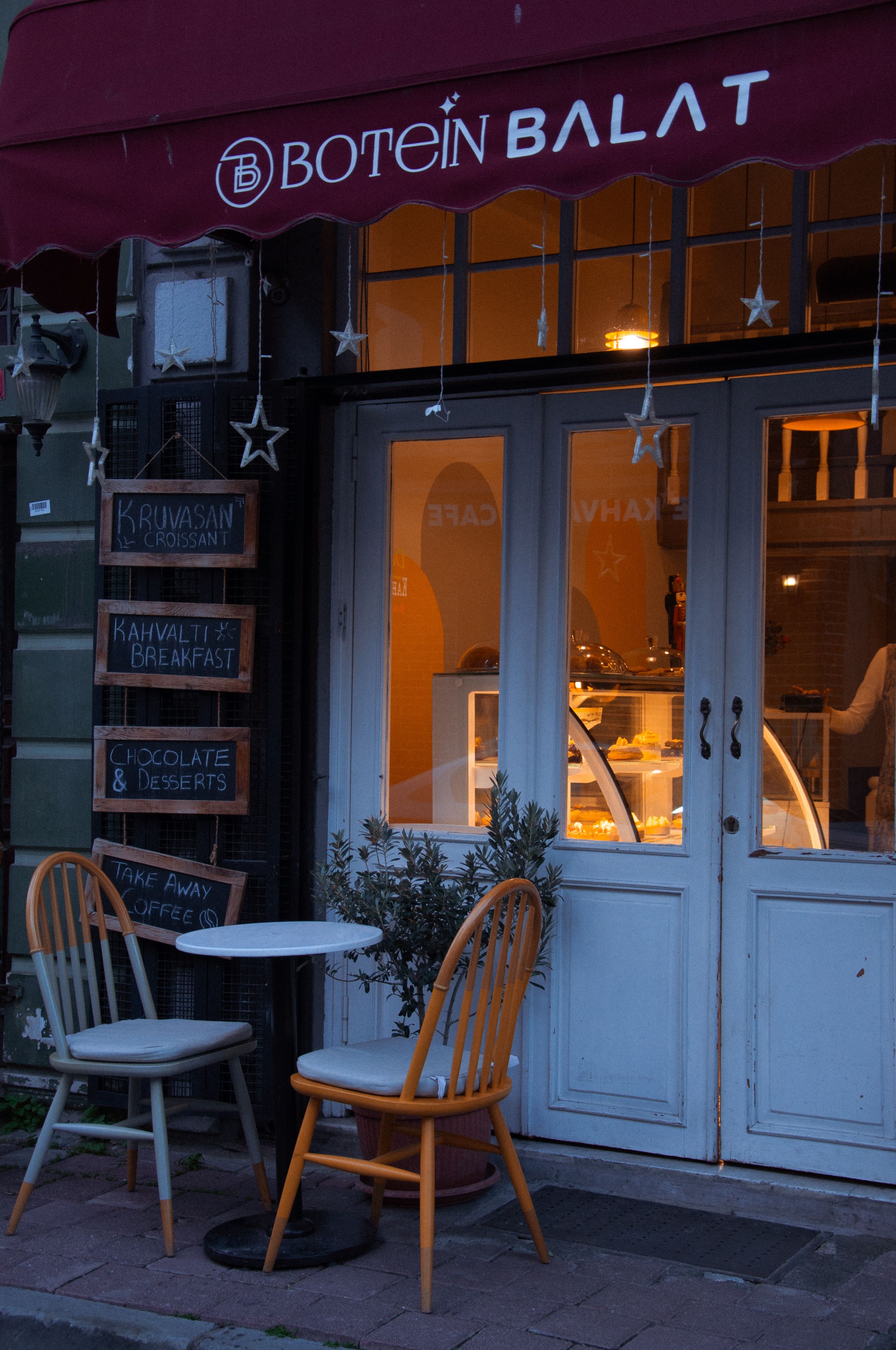 Cozy Cafe Entrance at Dusk in Balat · Free Stock Photo