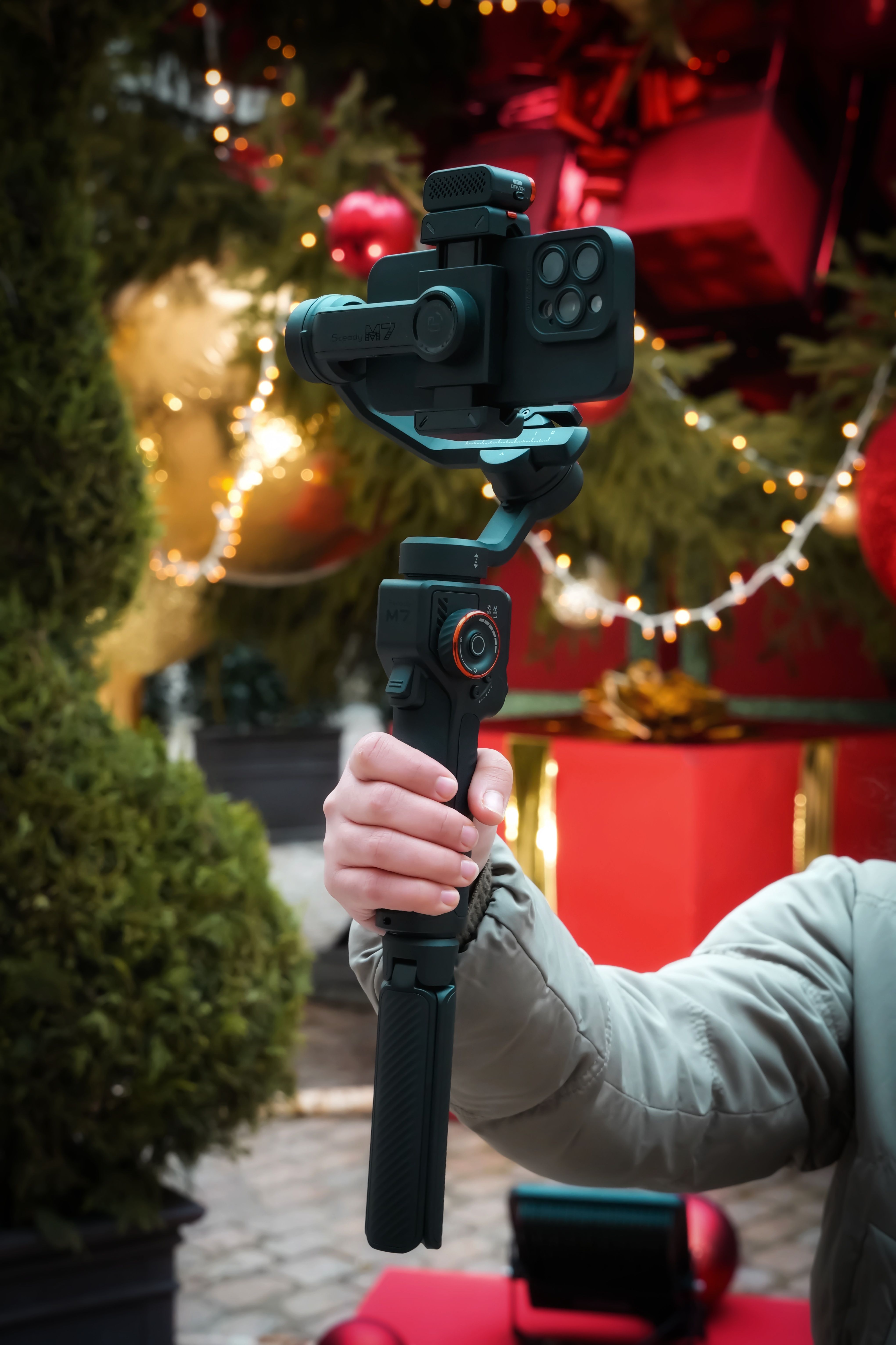 Close-up of Hand Holding Gimbal with Smartphone · Free Stock Photo