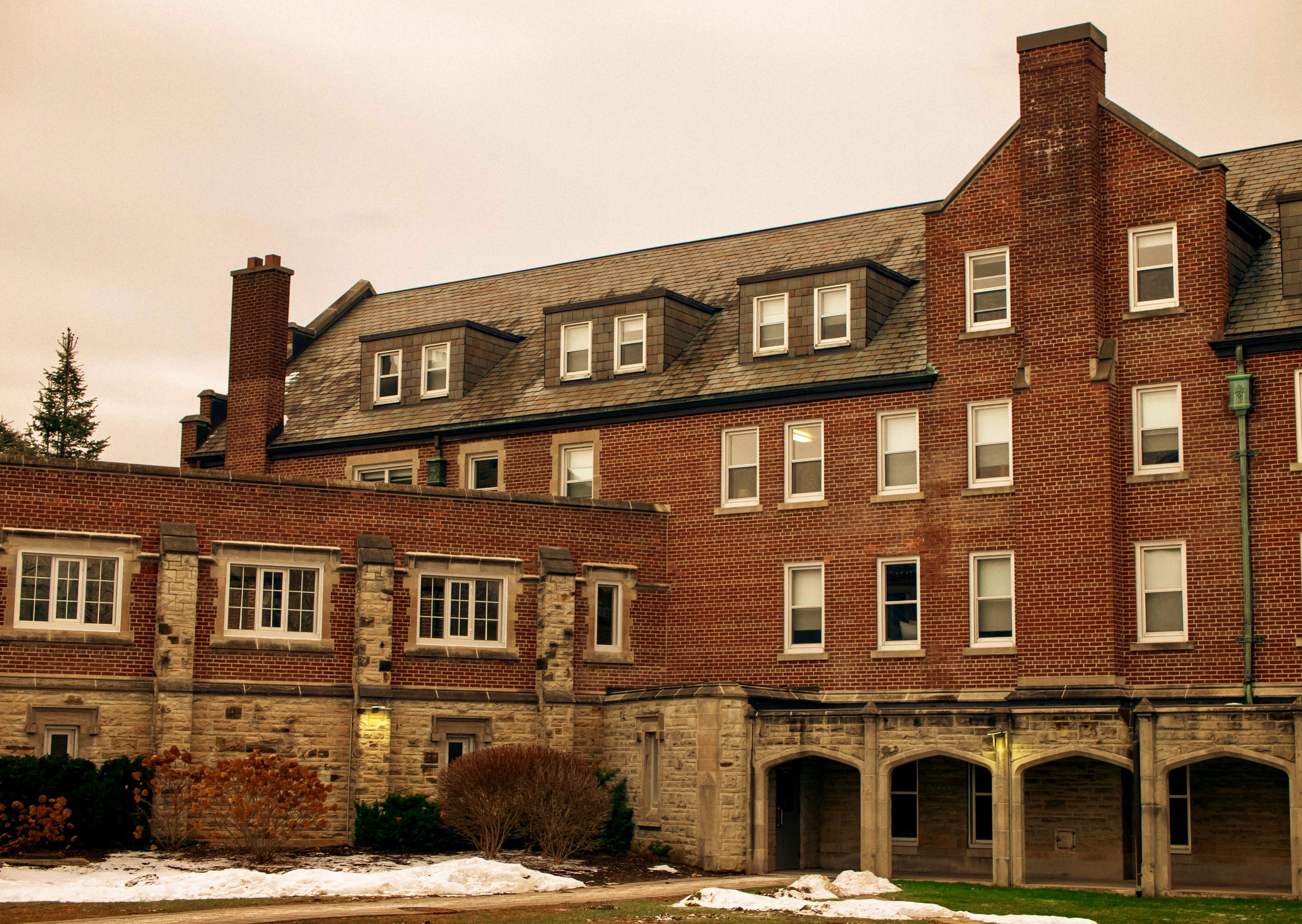 Historic Brick Building in Winter Atmosphere · Free Stock Photo