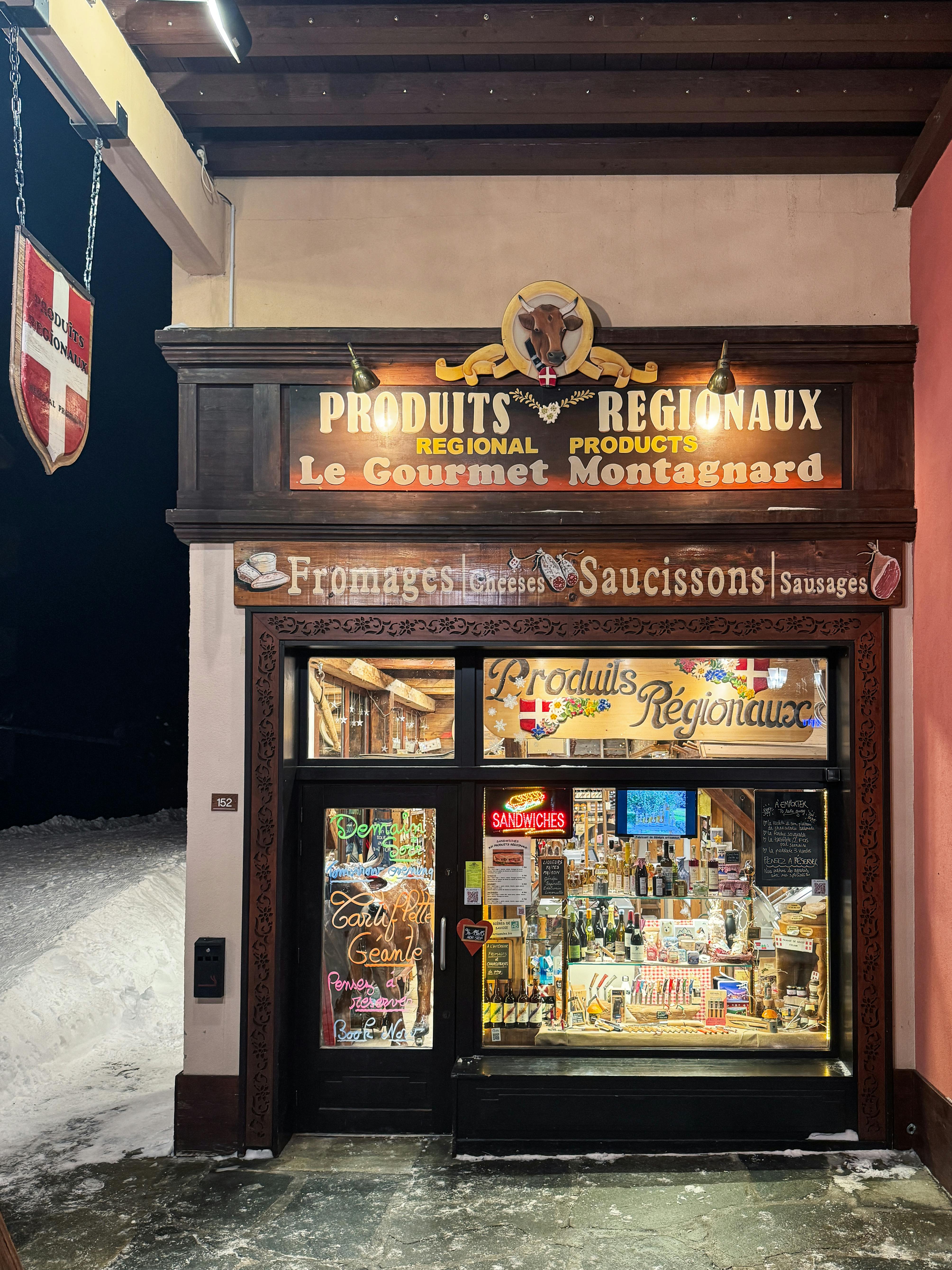 Charming French Shopfront in Les Arcs at Night · Free Stock Photo