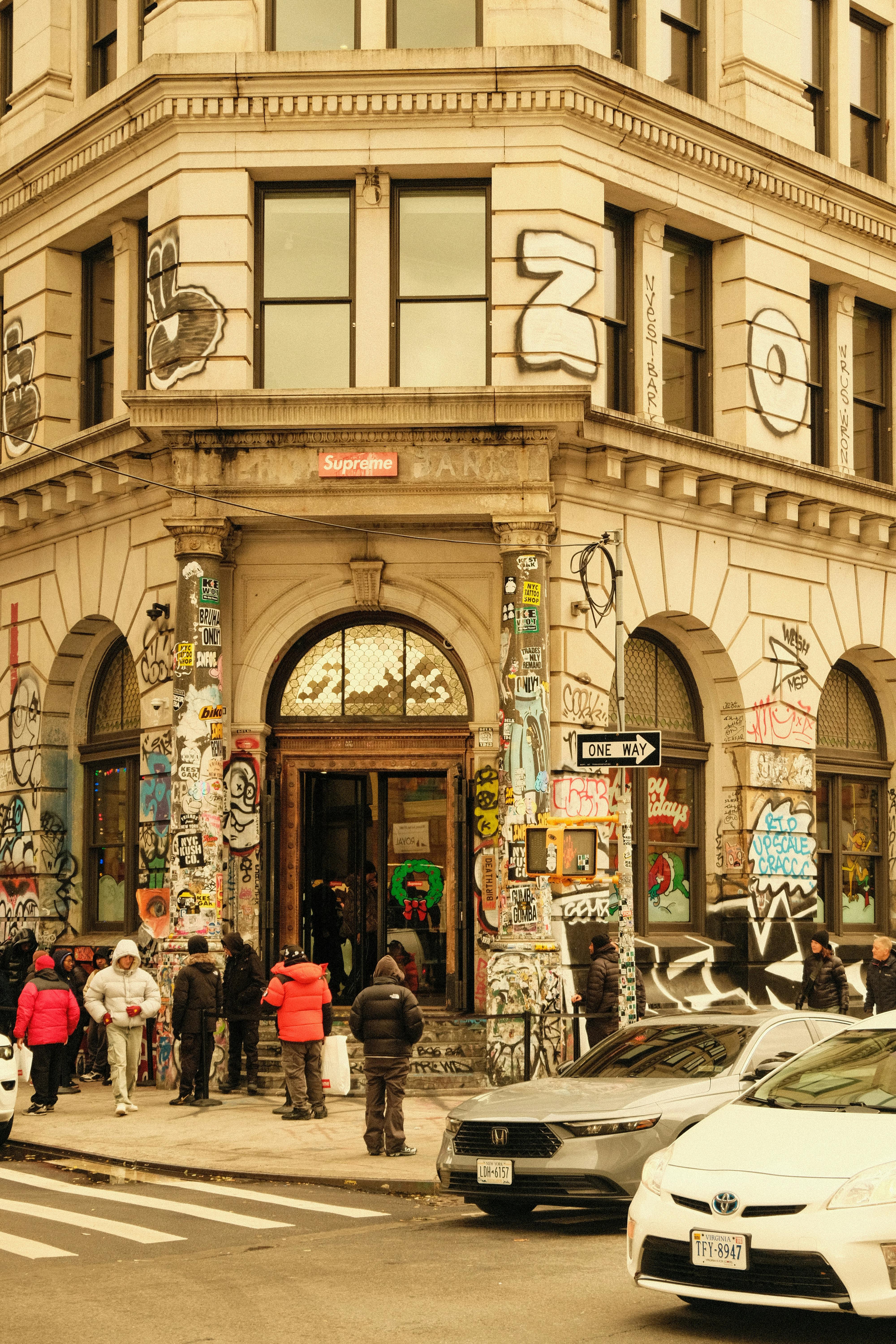 Urban storefront with vibrant graffiti · Free Stock Photo