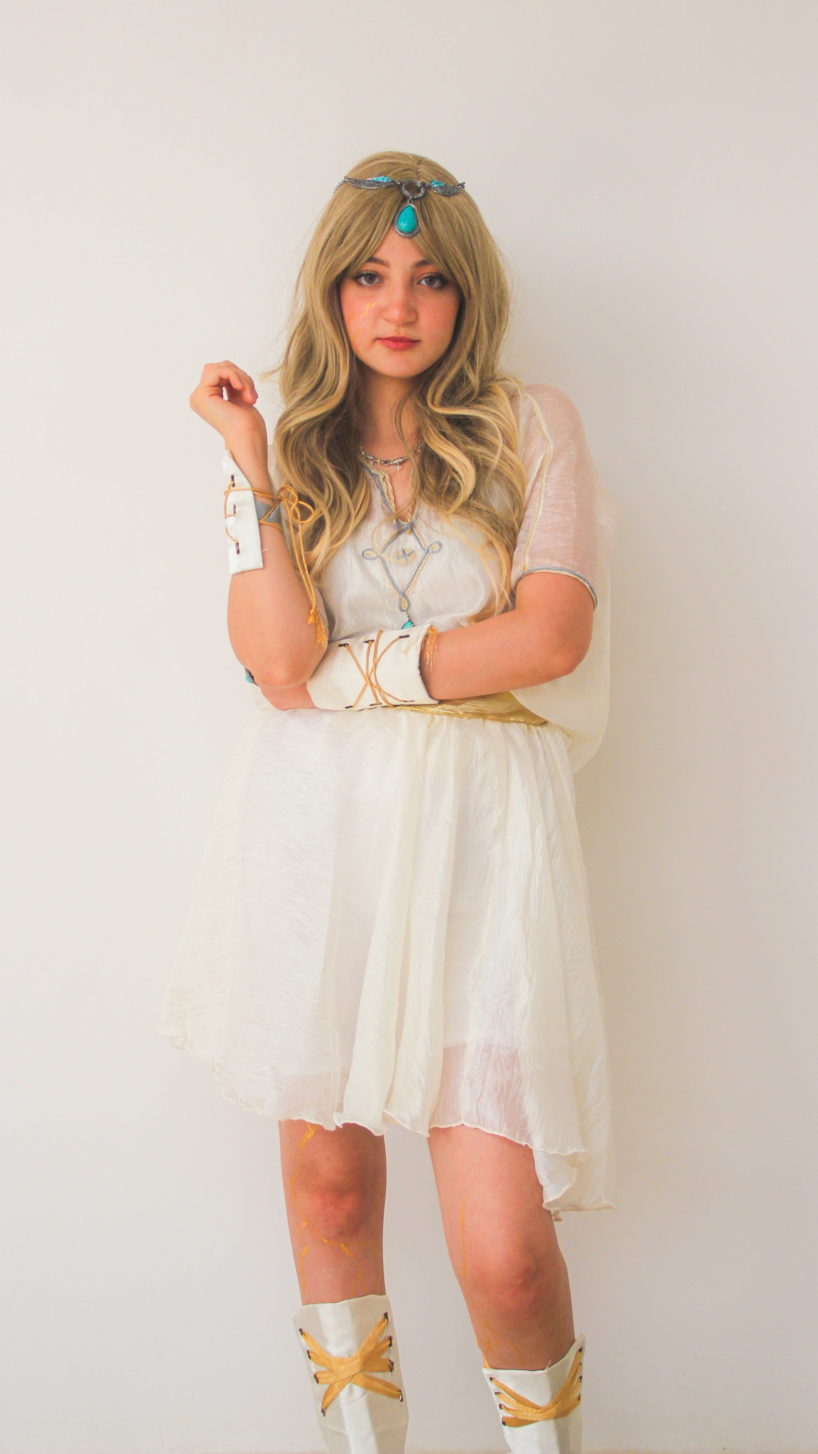 Elegant Cosplay Portrait of Woman in White Outfit · Free Stock Photo