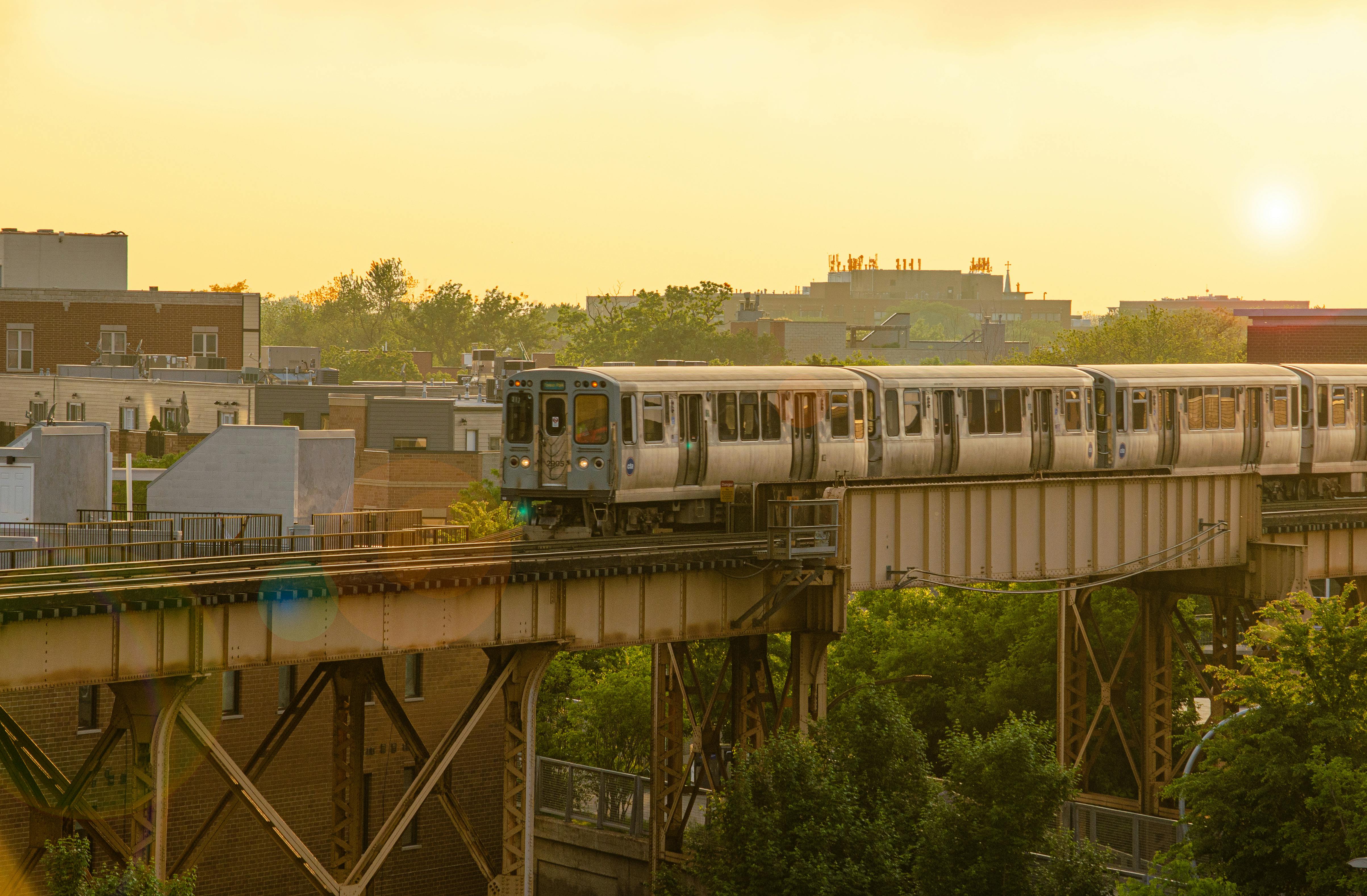 Train on Rail Tracks at Sunset · Free Stock Photo