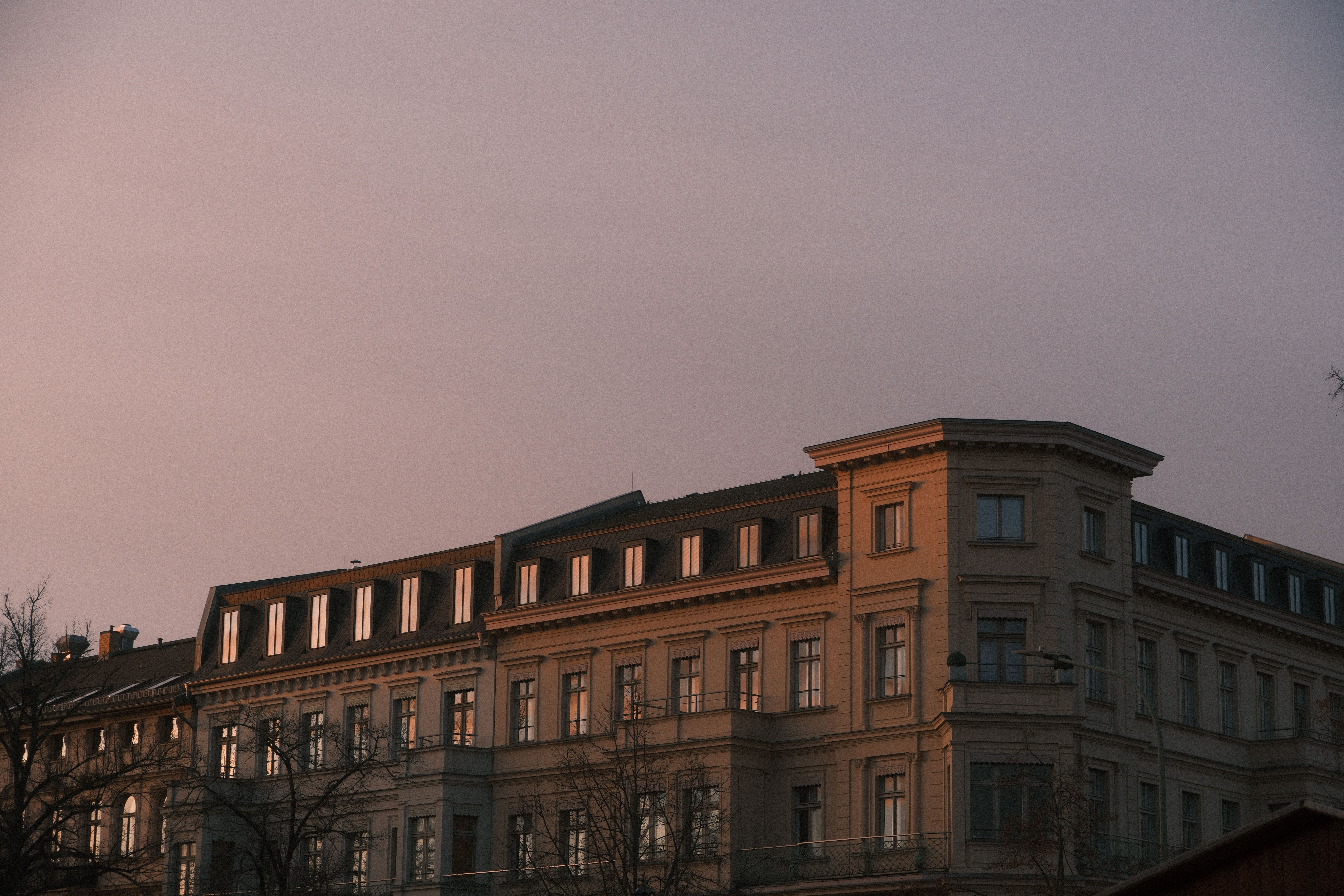 Elegant Building Facade at Sunset · Free Stock Photo