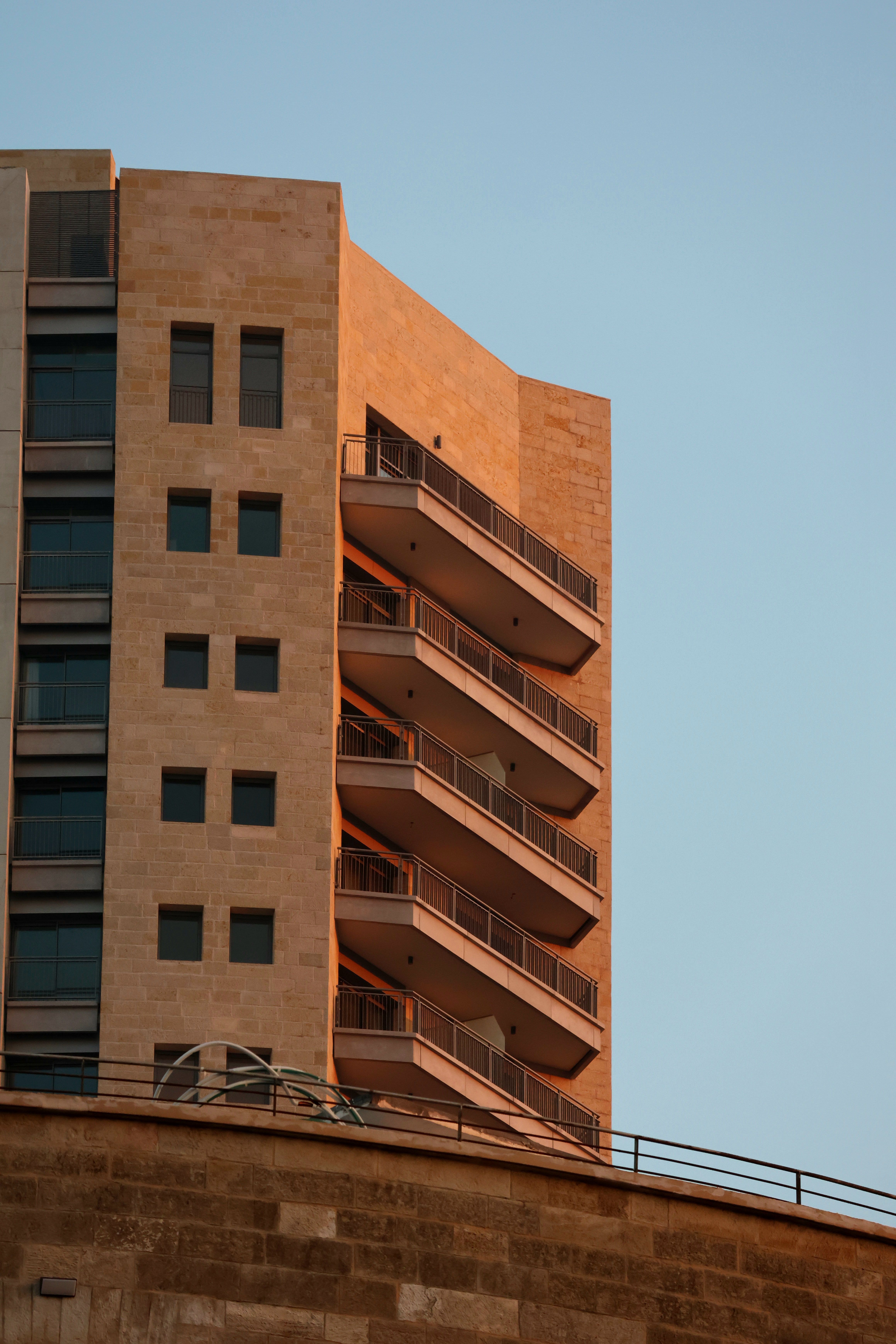 Modern Architectural Building in Warm Sunlight · Free Stock Photo