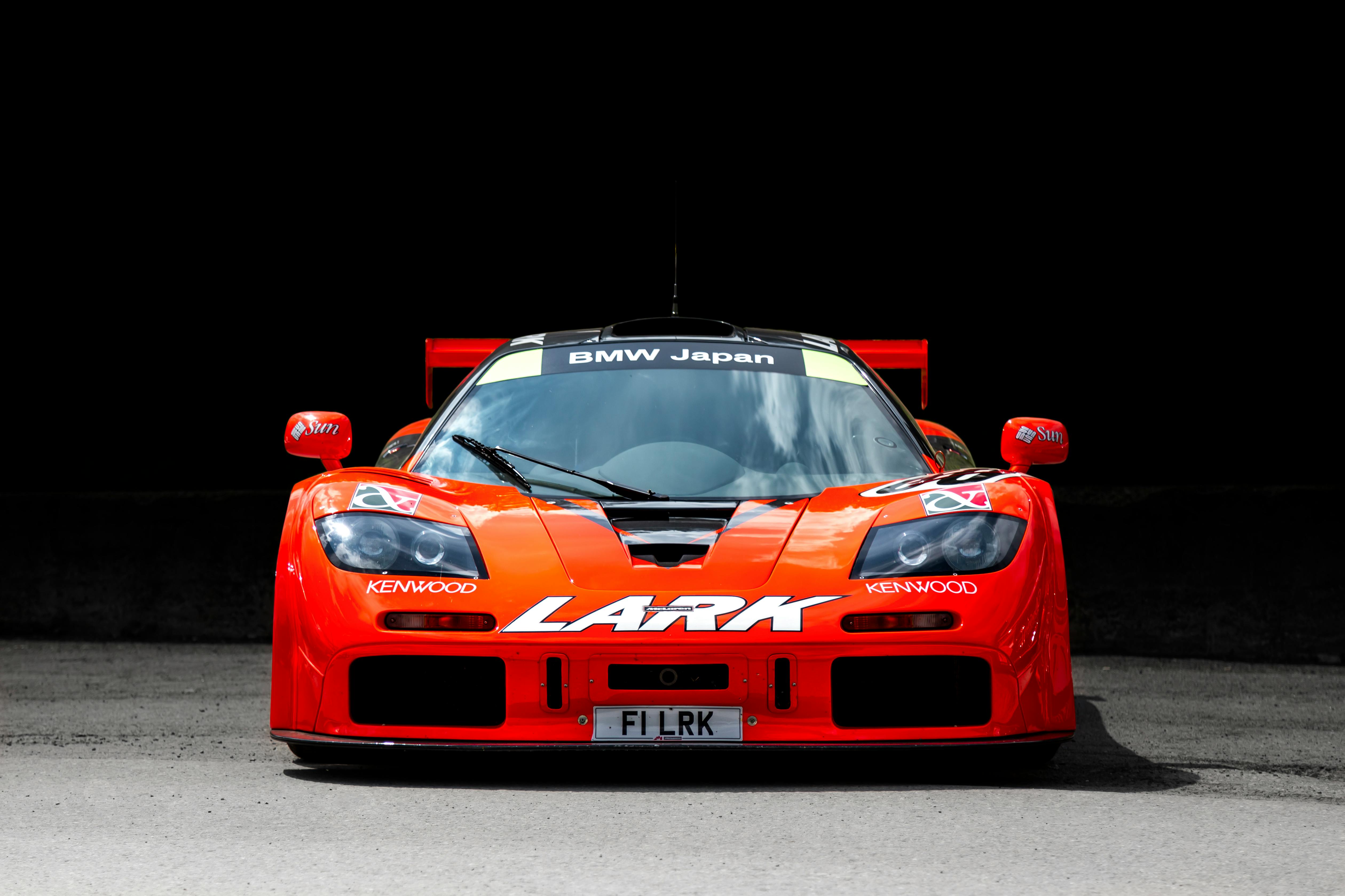 Vibrant Red McLaren F1 Racing Car Front View · Free Stock Photo
