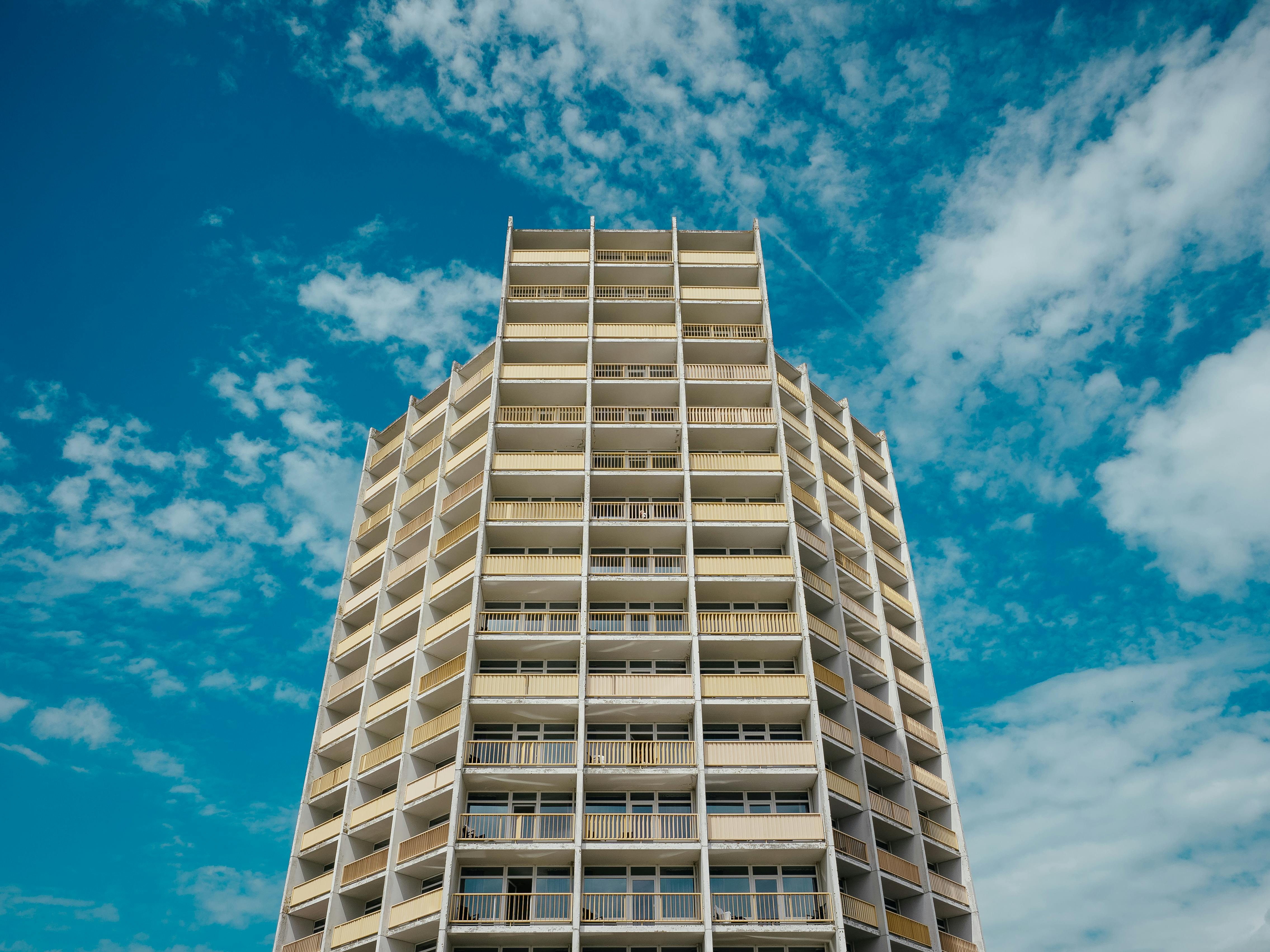 Modern High-Rise Building under Blue Sky · Free Stock Photo