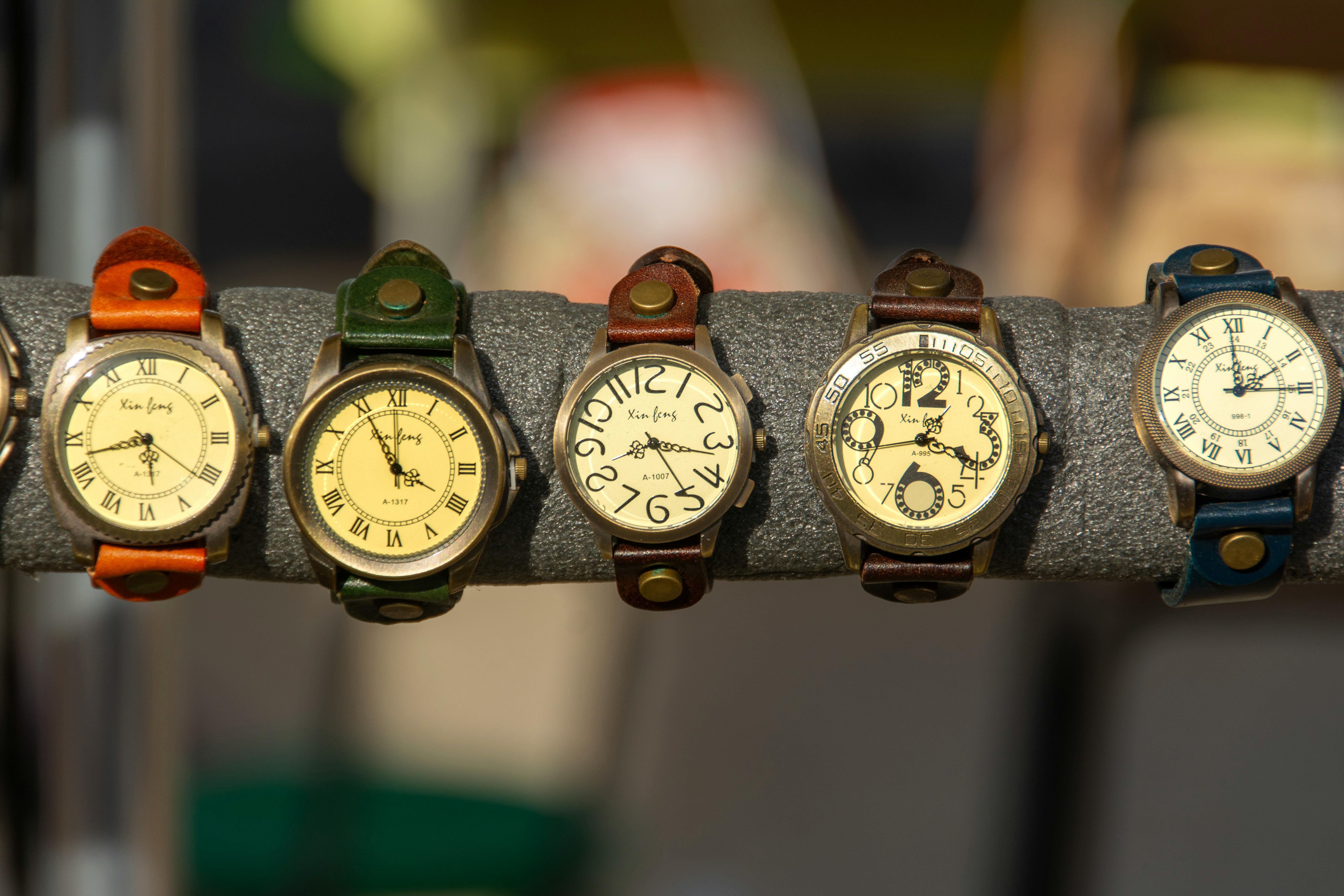 Vintage Leather Strap Watches on Display · Free Stock Photo