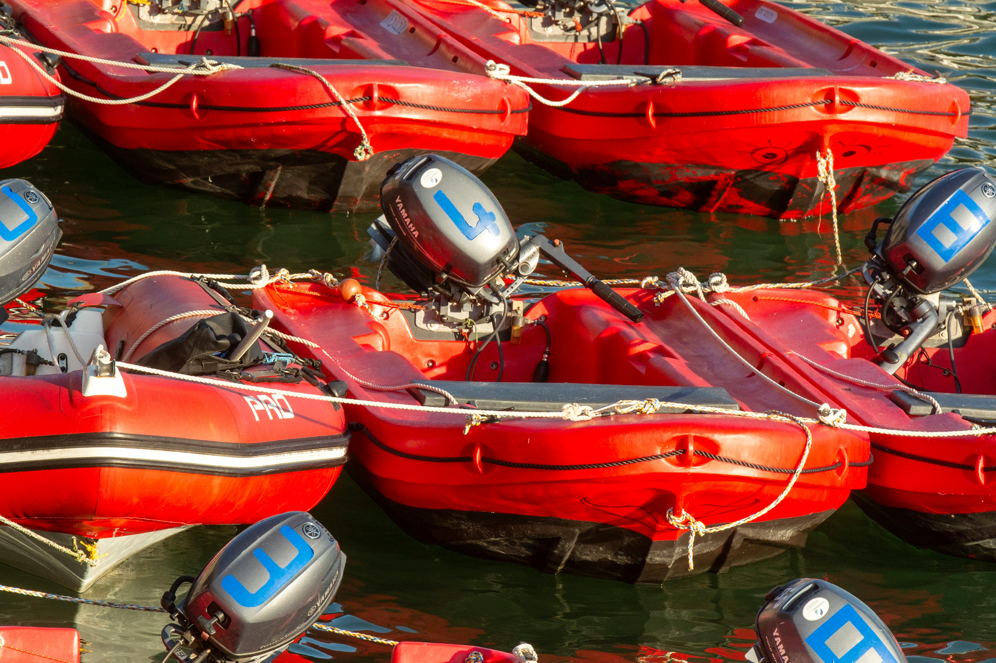 Red Inflatable Boats with Outboard Motors · Free Stock Photo