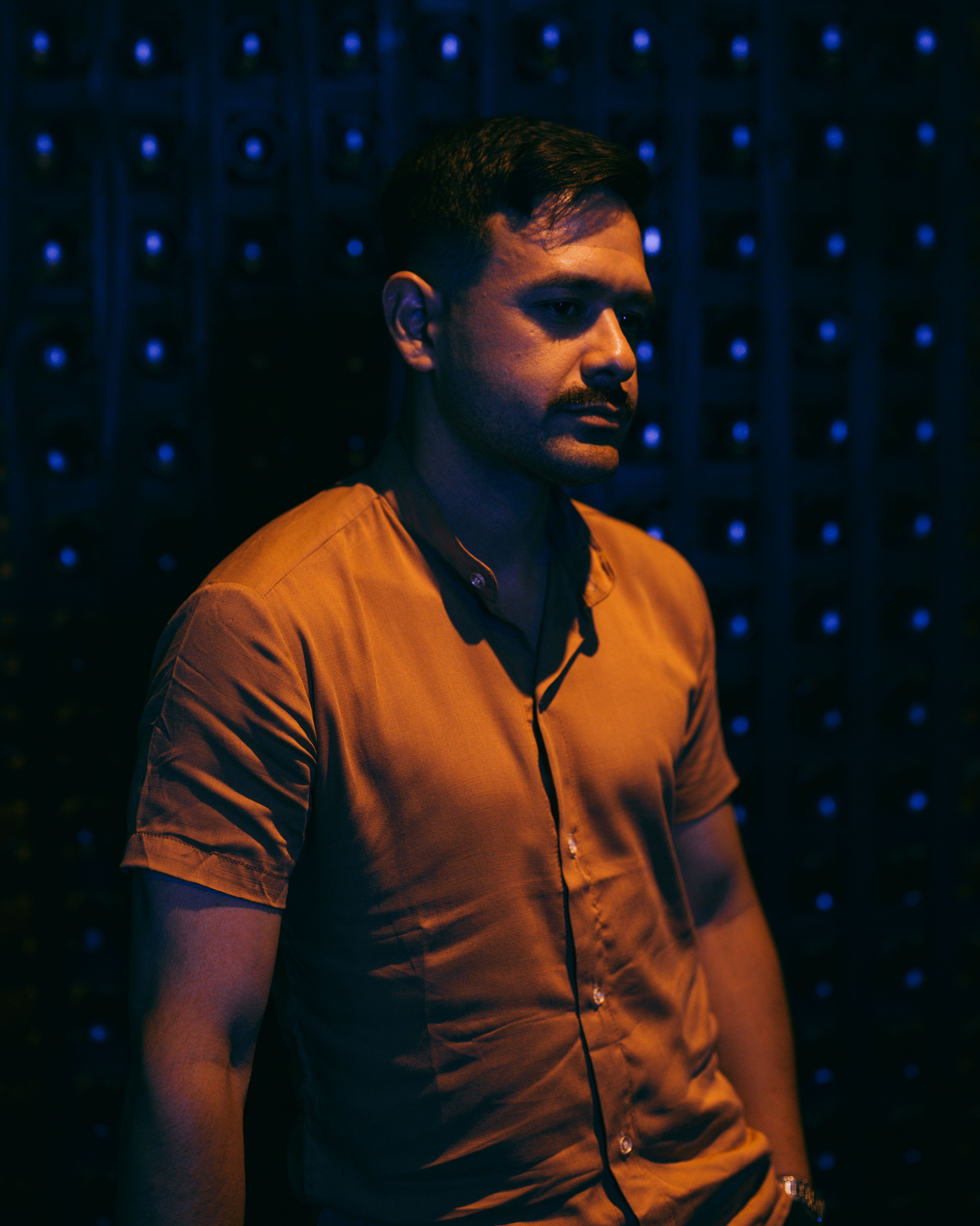 Portrait of a Man in Dramatic Lighting · Free Stock Photo