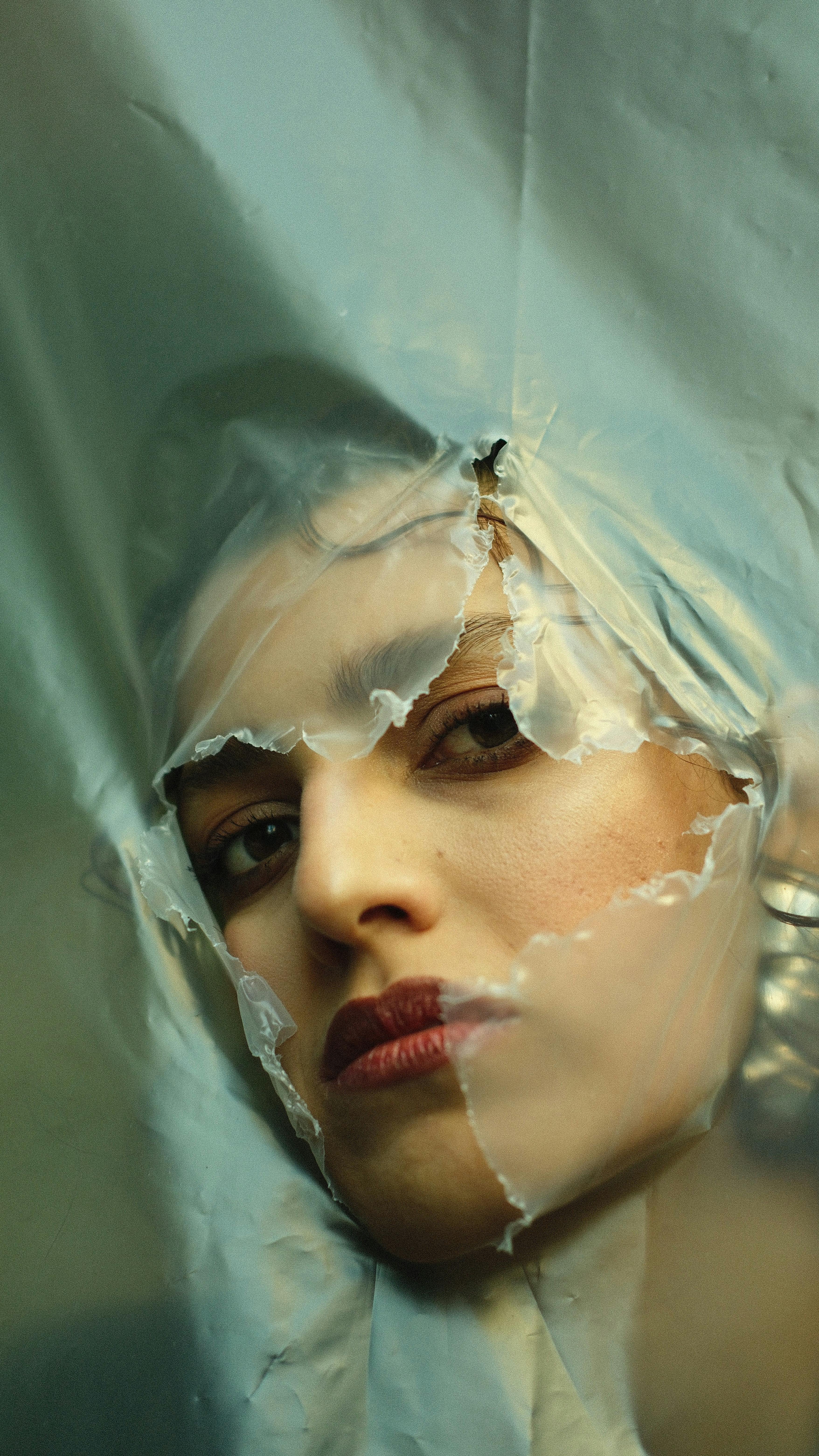 Artistic Portrait with Surreal Plastic Wrapping · Free Stock Photo