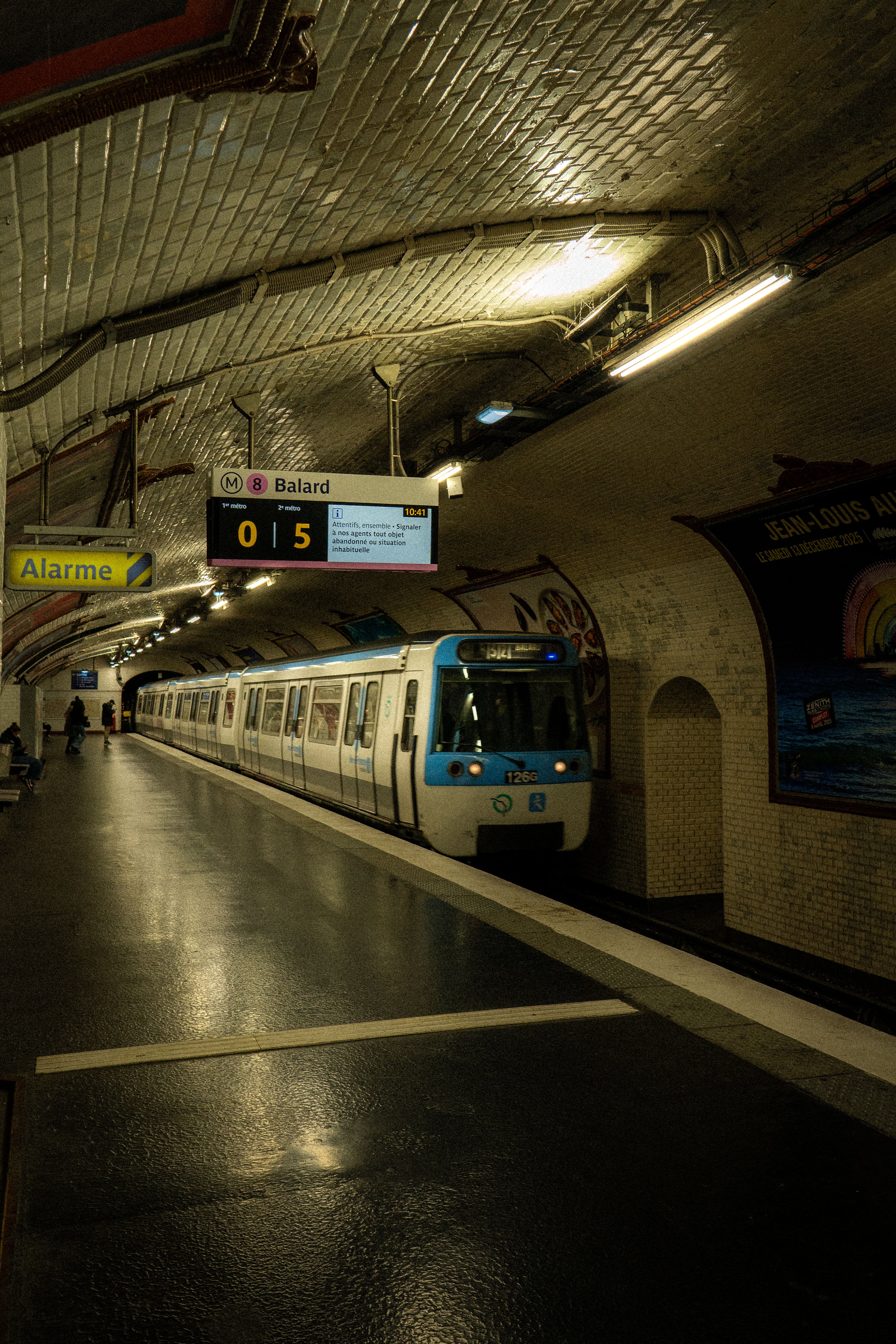 Paris Metro at Night in Moody Atmosphere · Free Stock Photo