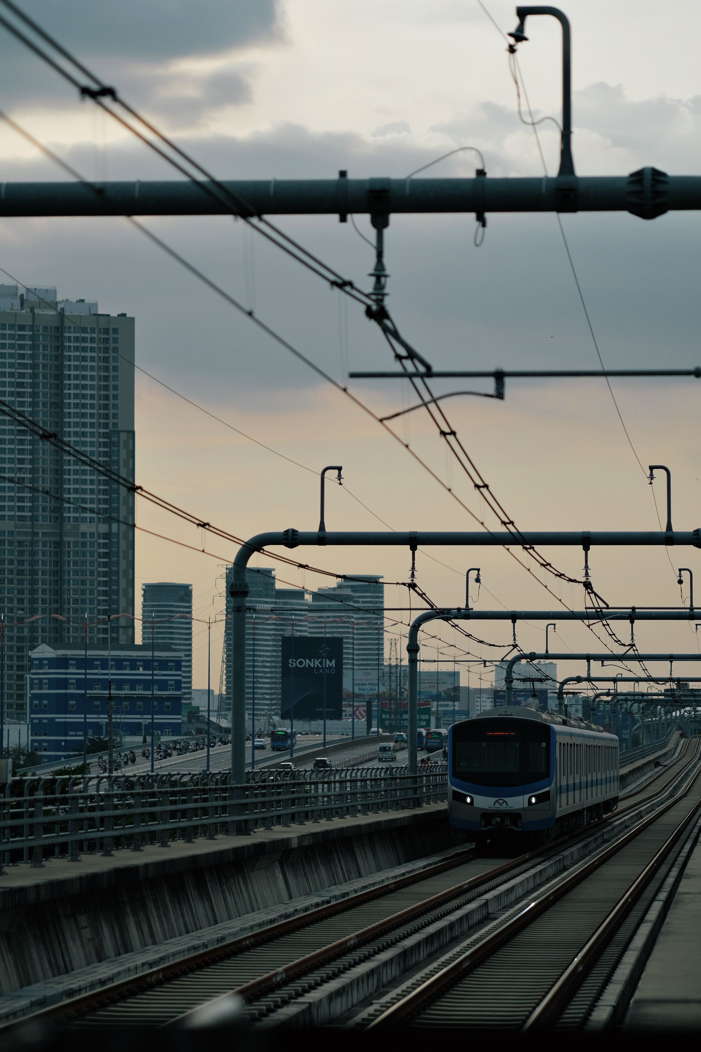 Metro Train on Elevated Tracks at Dusk · Free Stock Photo