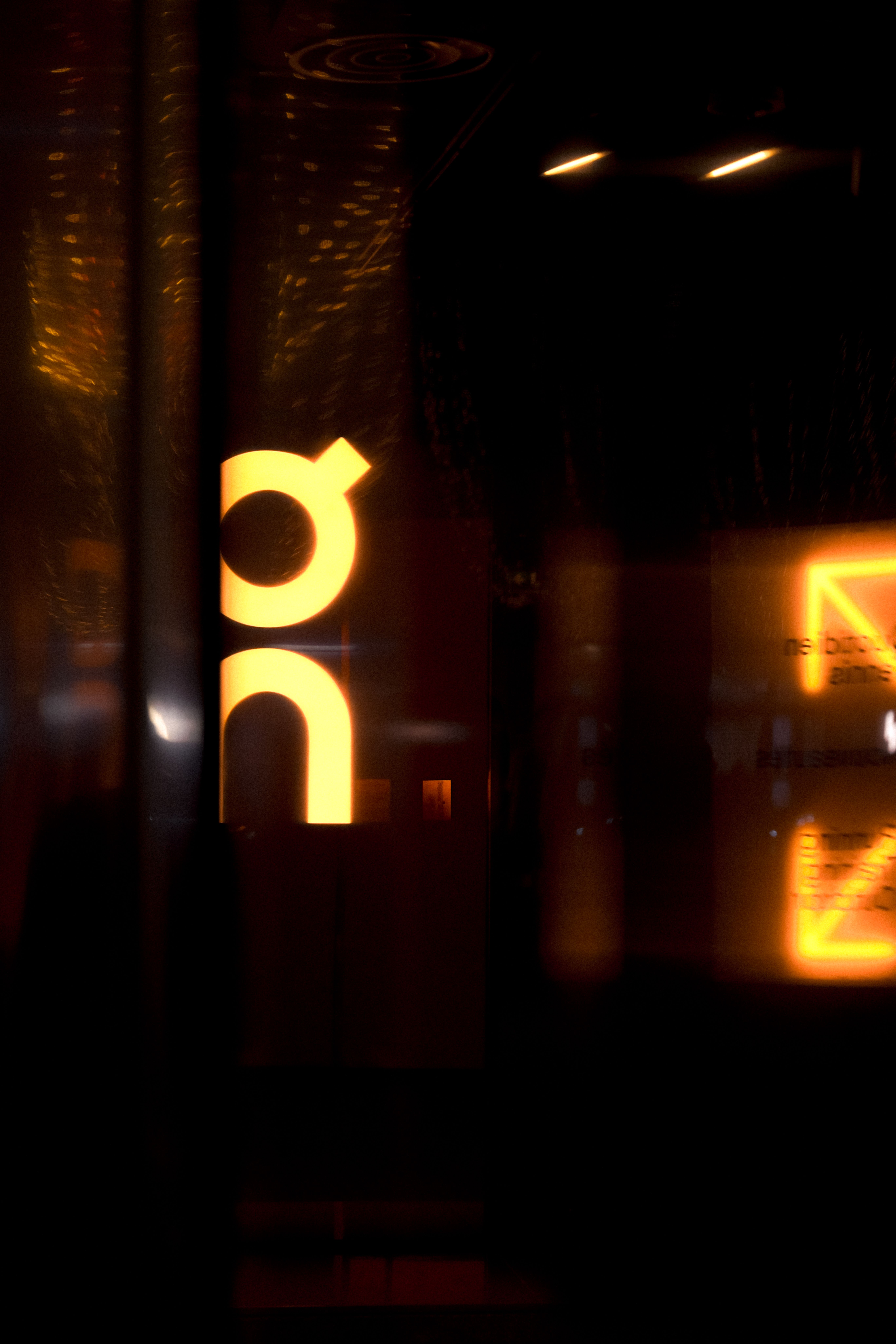 Abstract Illuminated Neon Sign at Night · Free Stock Photo