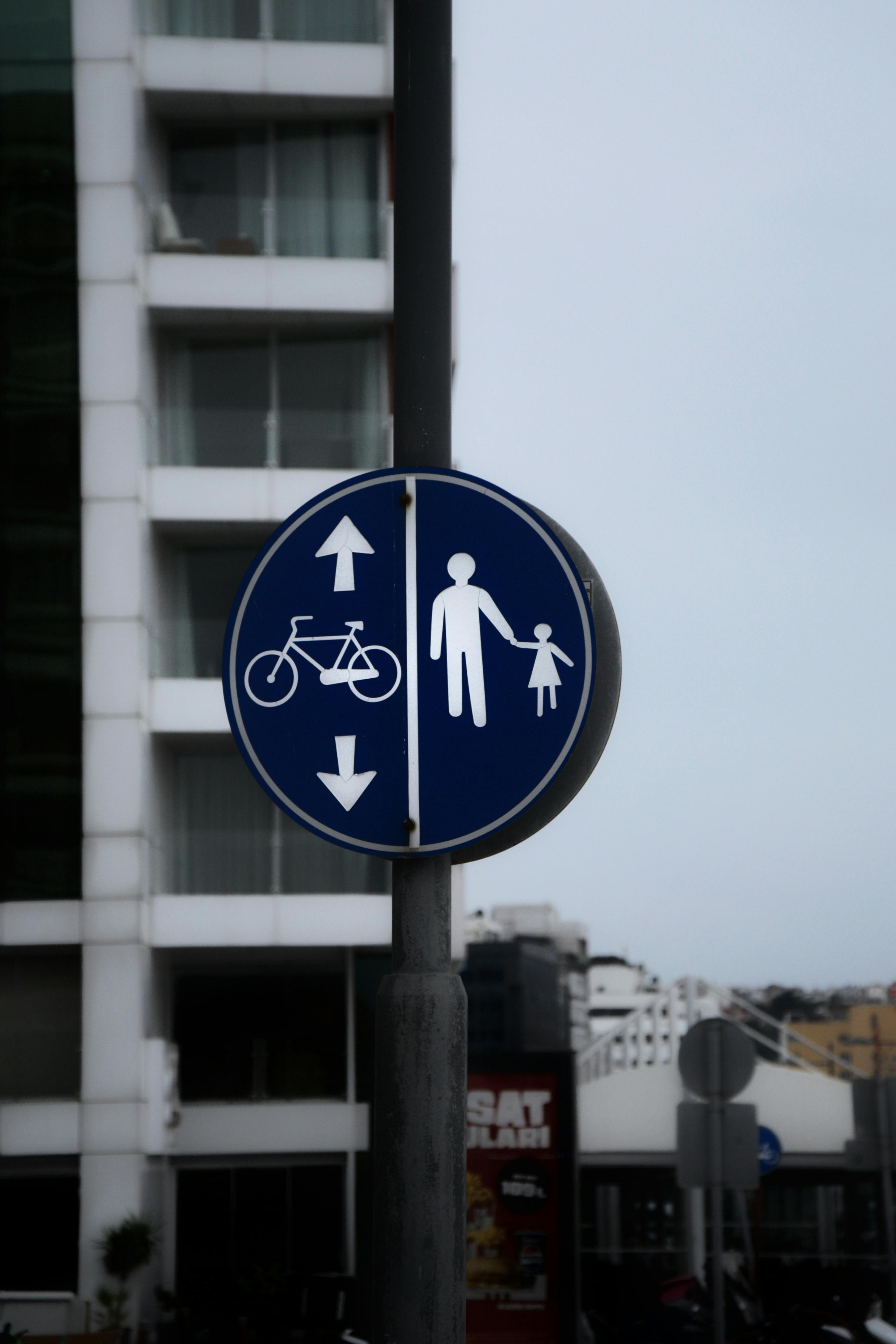 Pedestrian and Bicycle Path Sign in Urban Area · Free Stock Photo