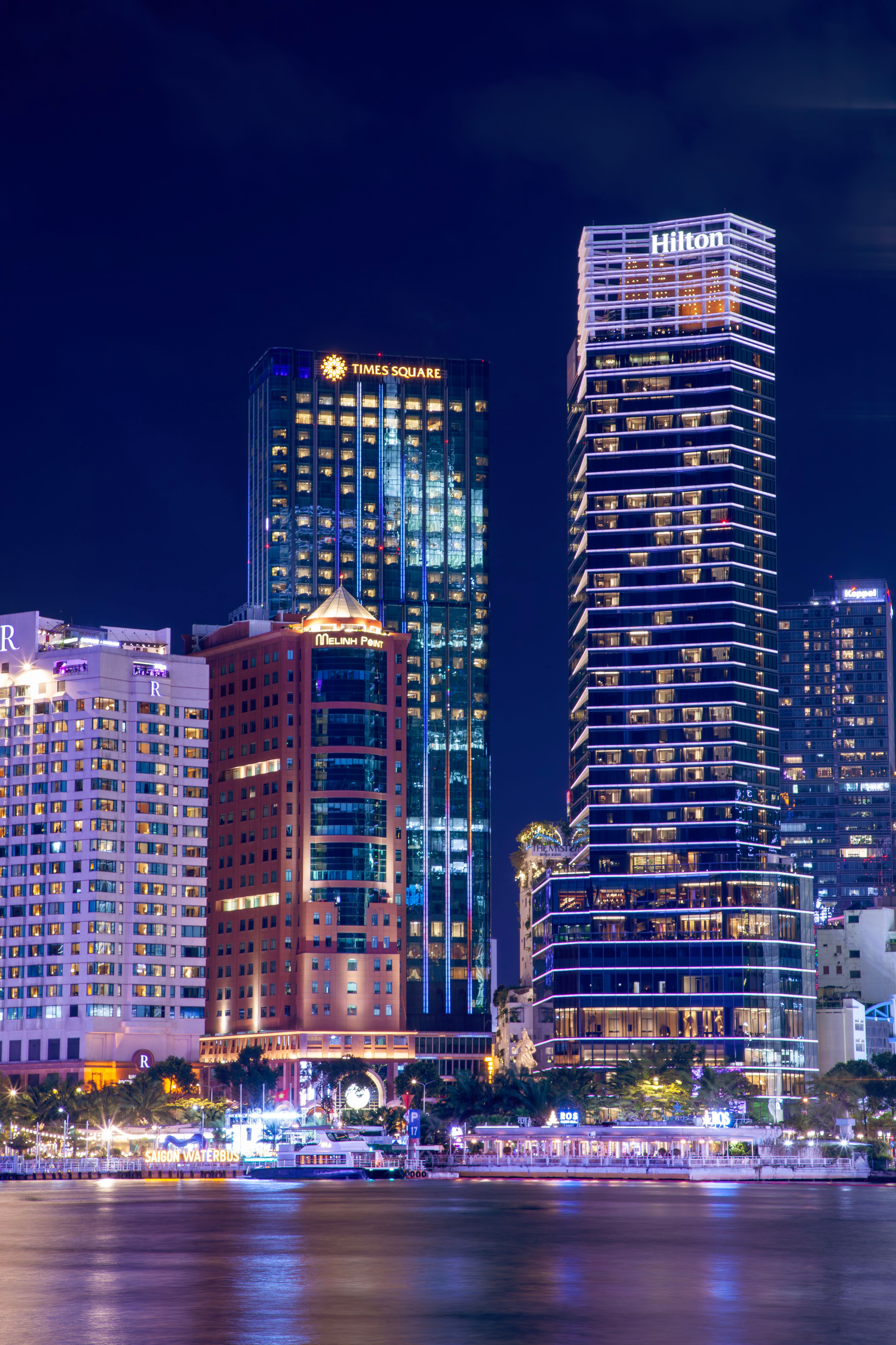 Nightscape of a Vibrant City Skyline with Illuminated Skyscrapers ...