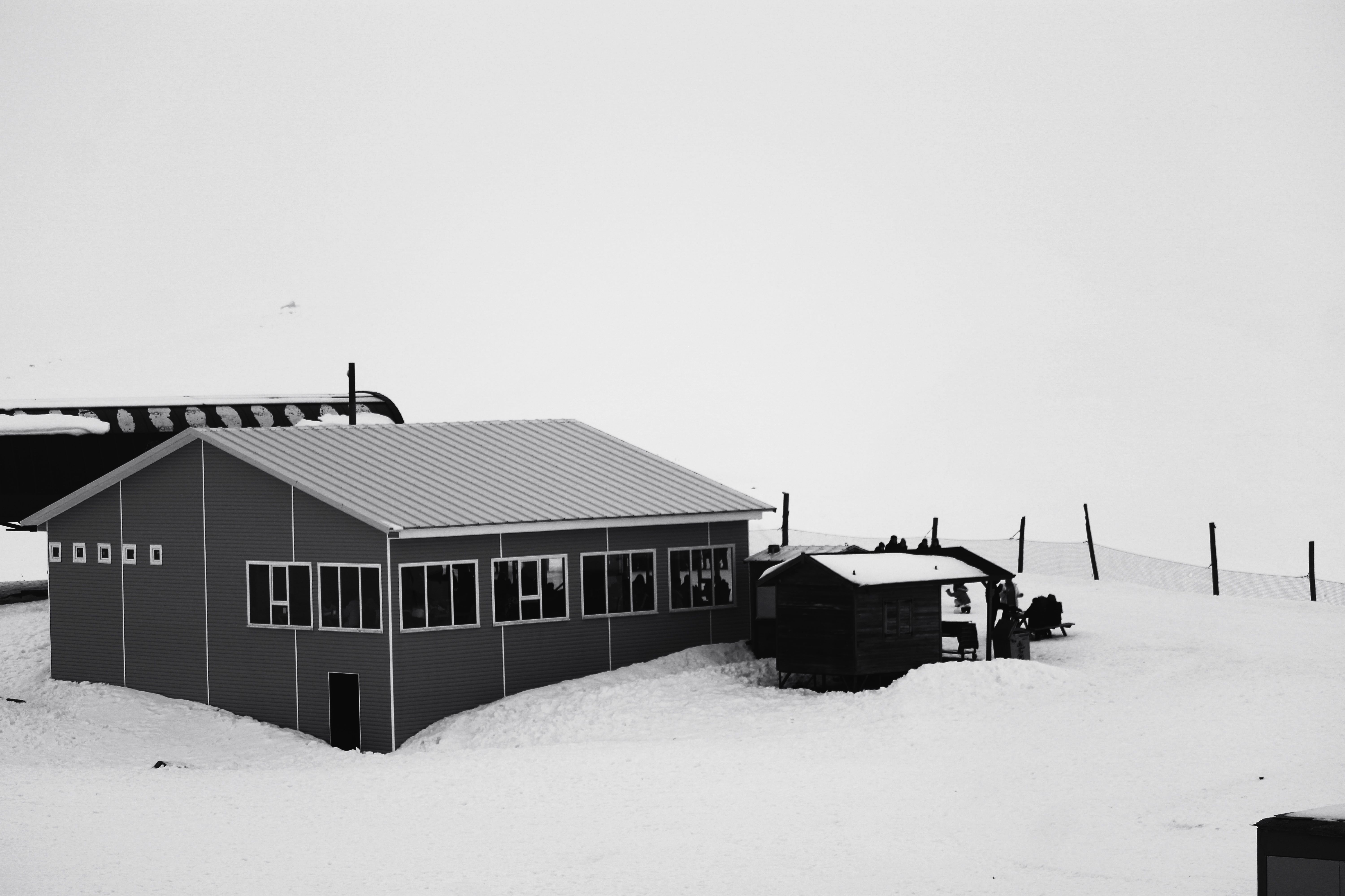 Remote Snow-Covered Building in Winter · Free Stock Photo