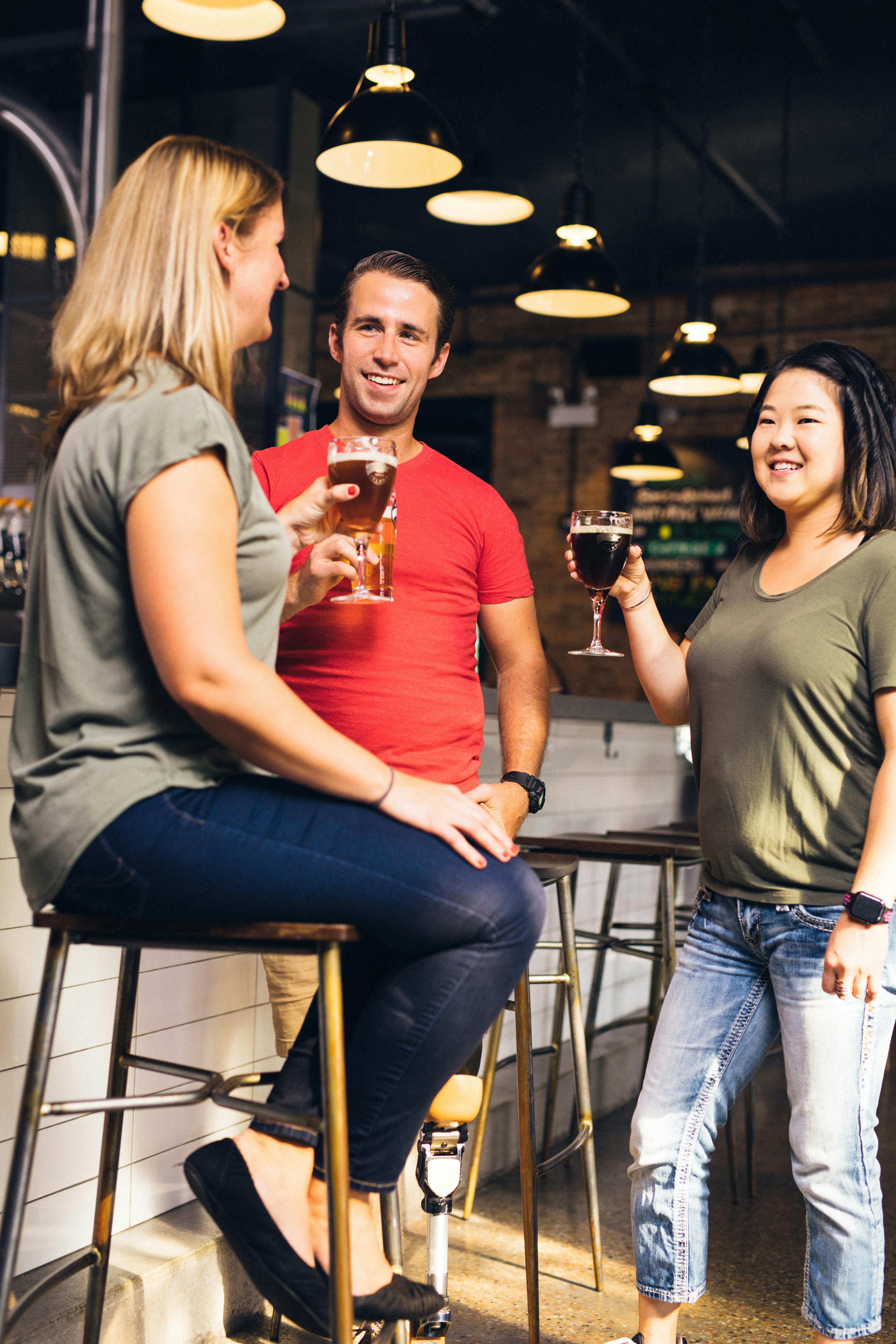 Man Handing a Beer From the Cooler · Free Stock Photo