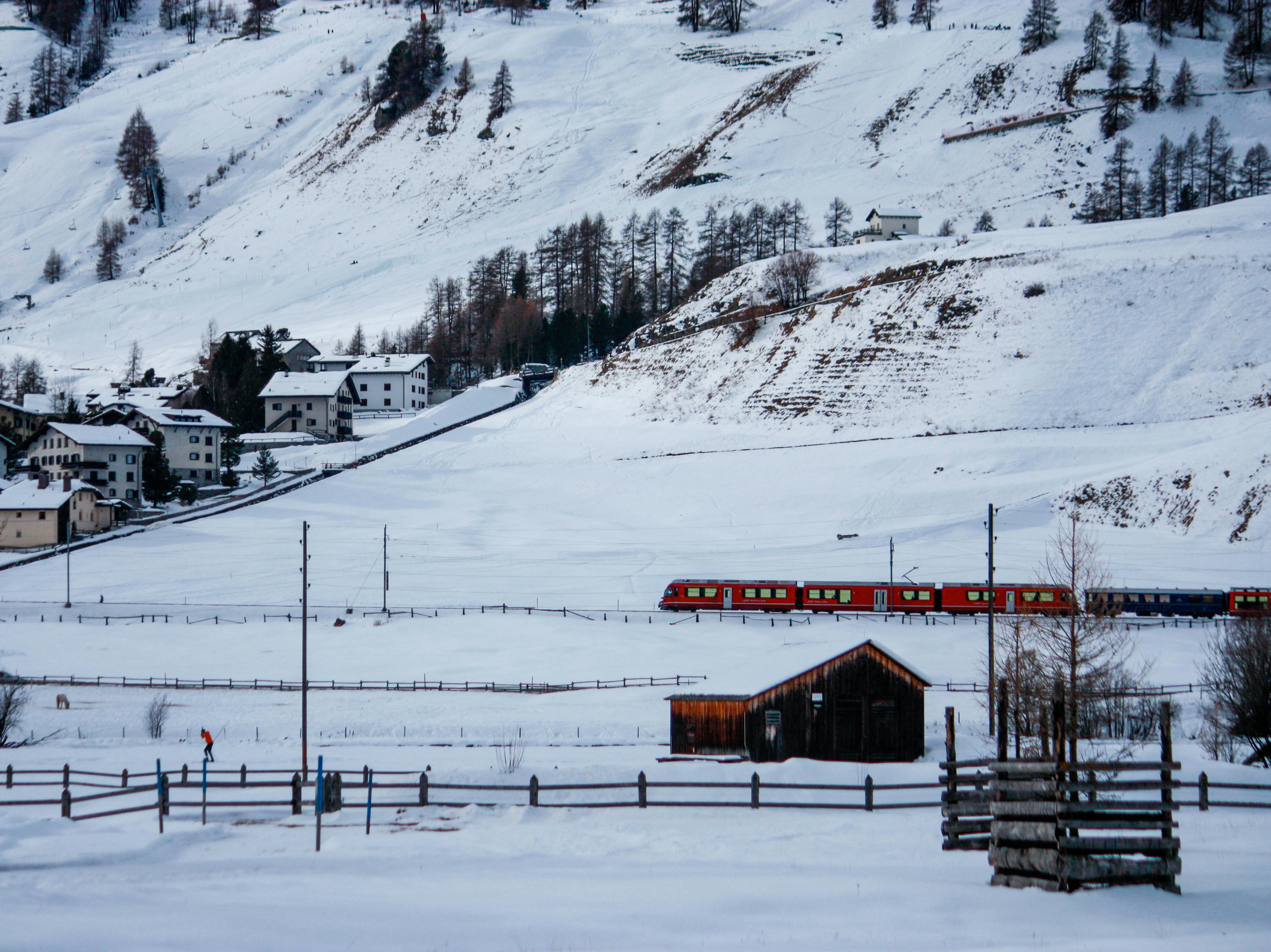 Winter Landscape with Train in Celerina · Free Stock Photo
