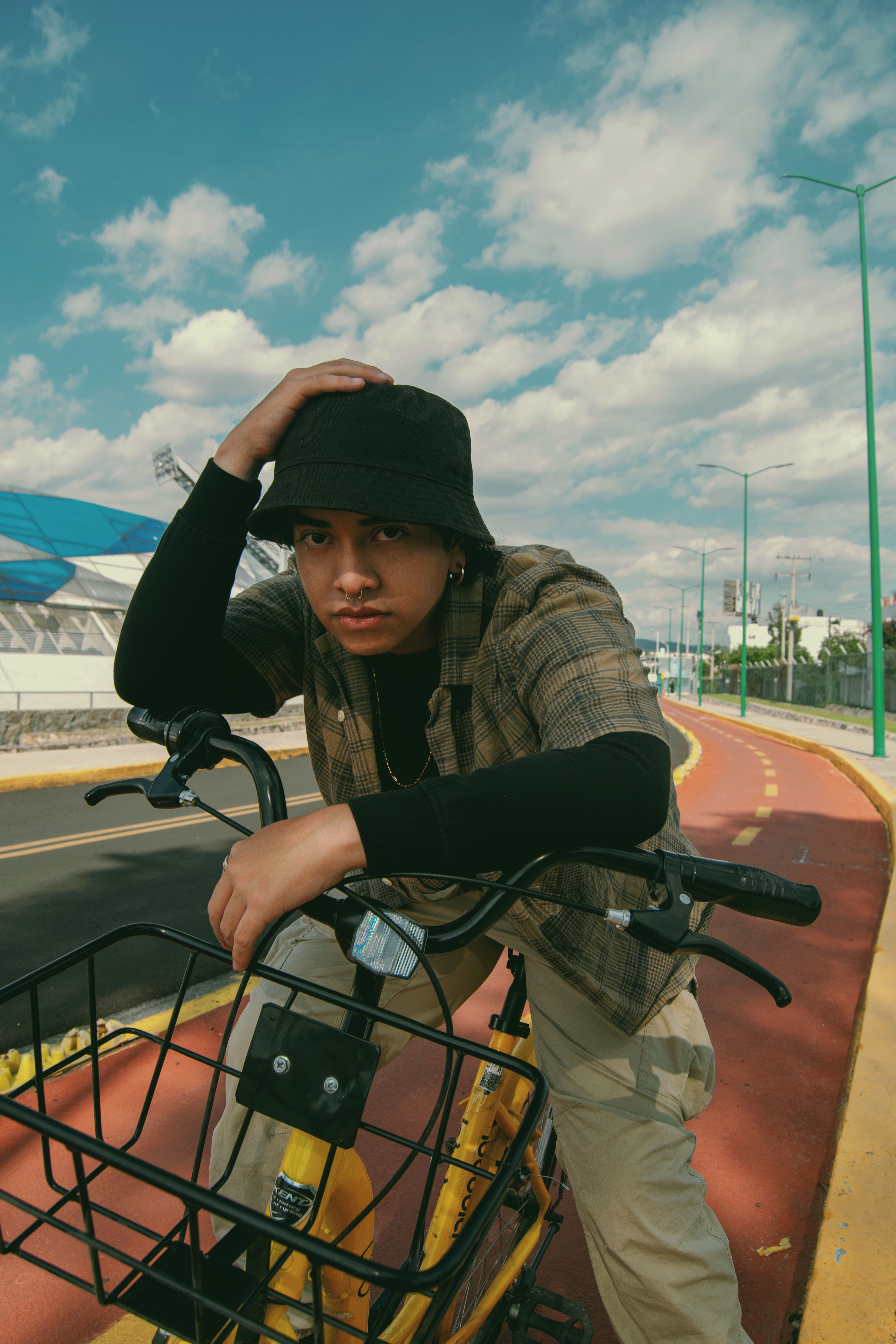 Urban Biker on City Street in Daylight · Free Stock Photo