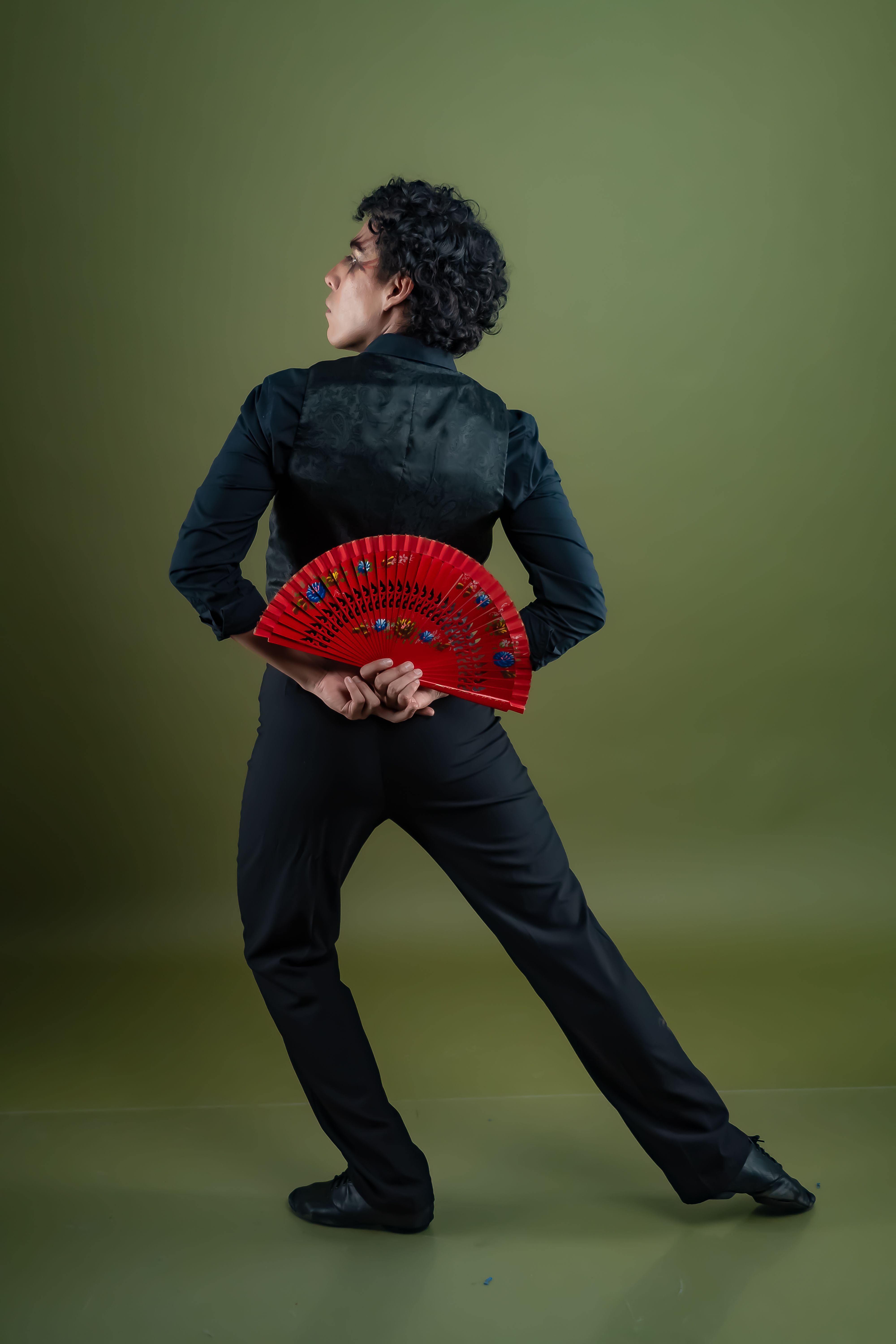 Flamenco Dancer with Red Fan in Studio · Free Stock Photo